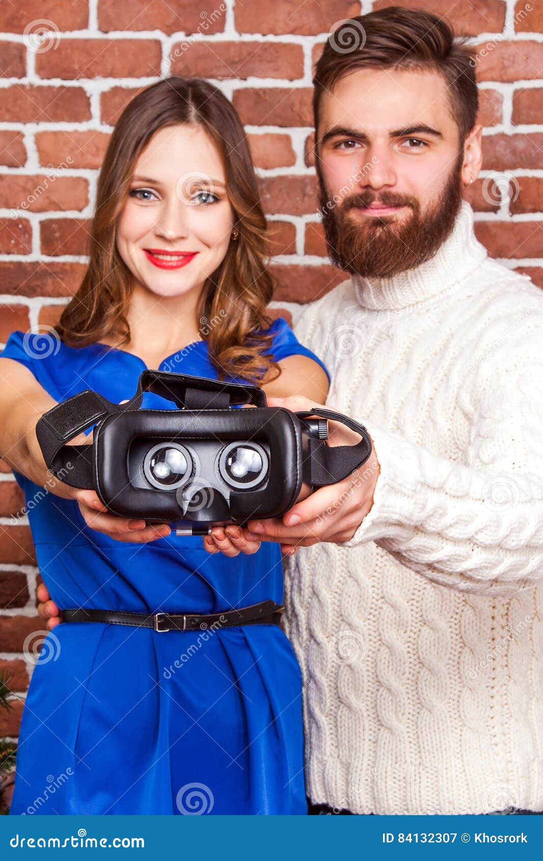 Beautiful Happy Couple Holding and Sharing Virtual Reality Headset ...