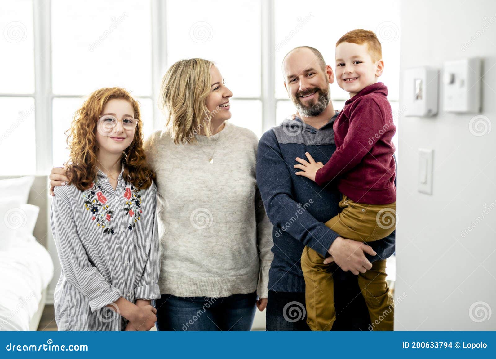 A Beautiful Happy Family Together at Home Stock Photo - Image of child ...