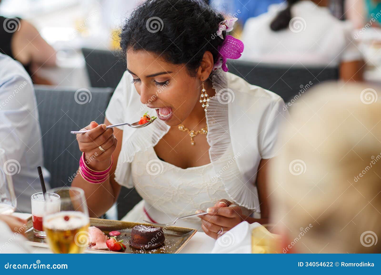 Beautiful Happy Indian Bride Eating on Wedding Dinner. Stock Photo ...