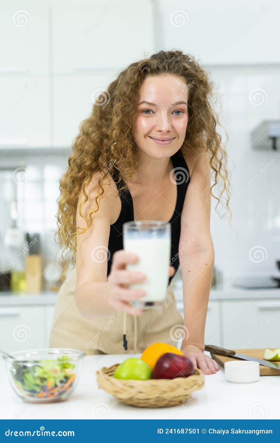 Beautiful Healthy Woman Show Milk In Glass Smile Happy Look At
