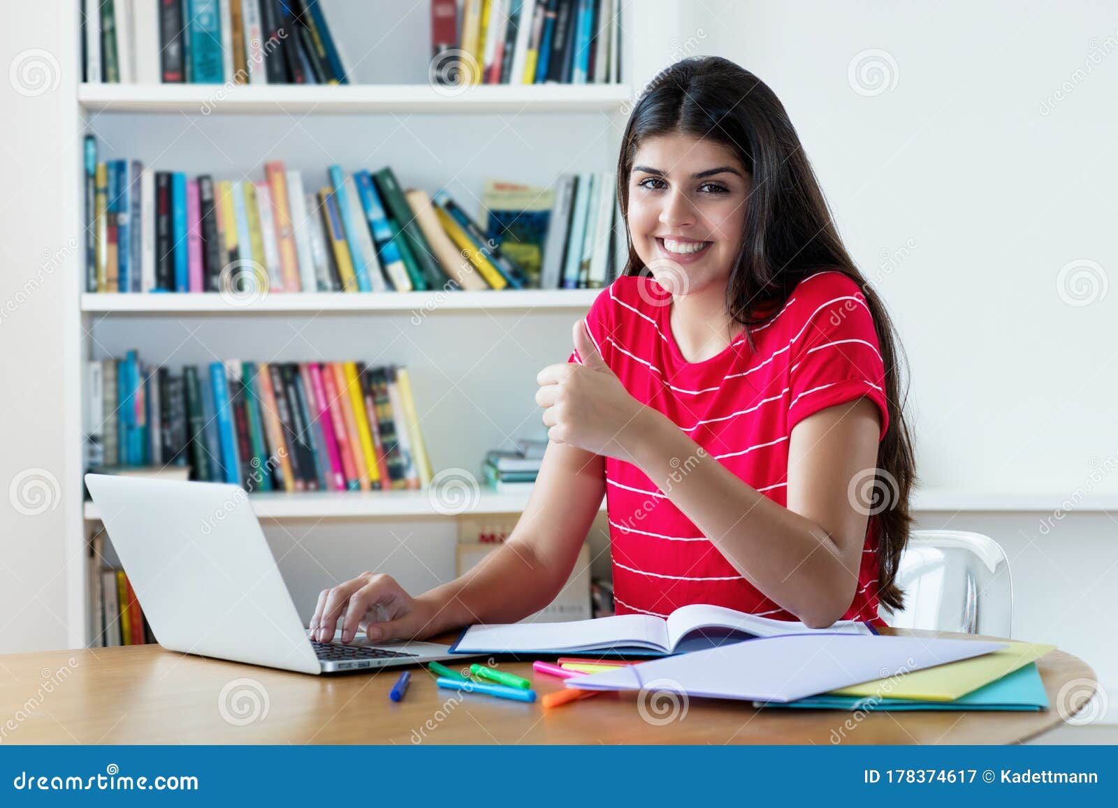 Beautiful Hispanic Female Student Learning Language Online Using ...