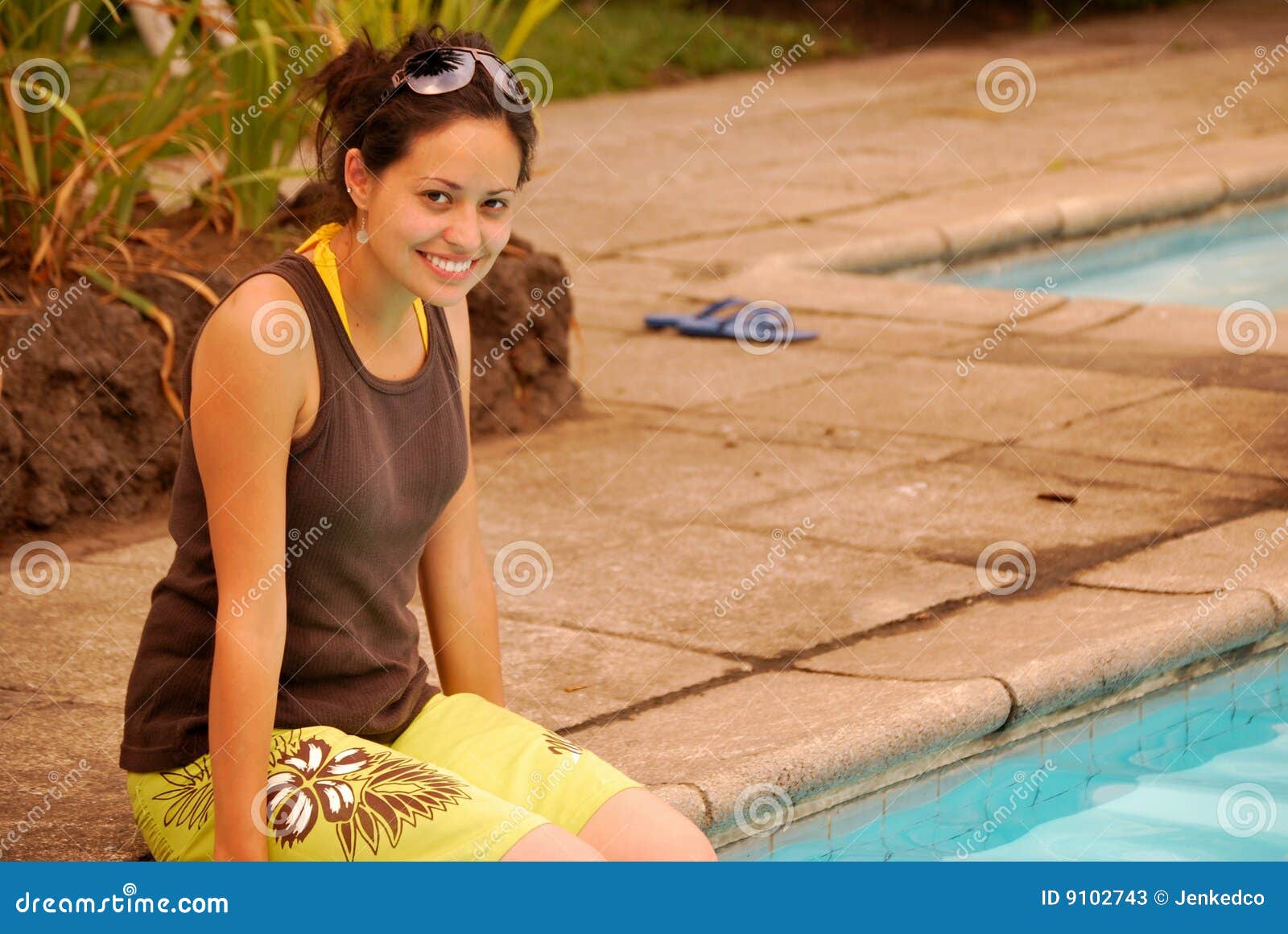 Beautiful Hispanic Woman by the Pool Stock Image - Image of athletic ...