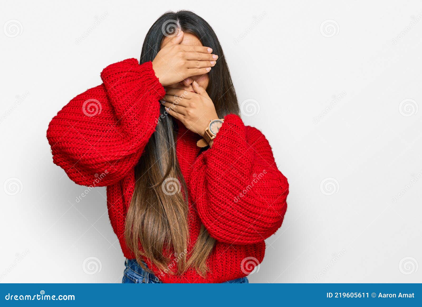 Beautiful Hispanic Woman Wearing Casual Clothes Covering Eyes And Mouth