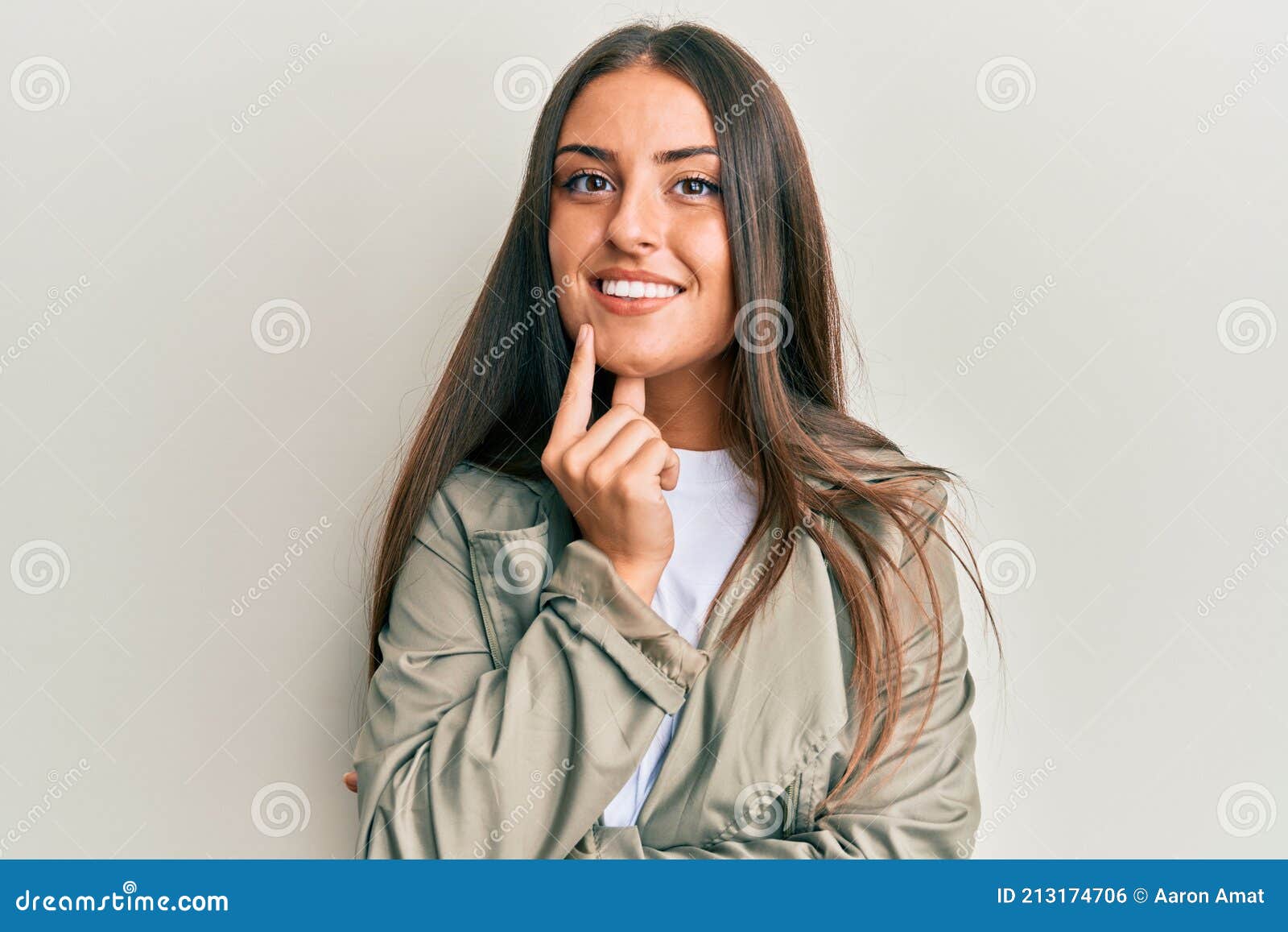 Beautiful Hispanic Woman Wearing Casual Clothes Smiling Looking