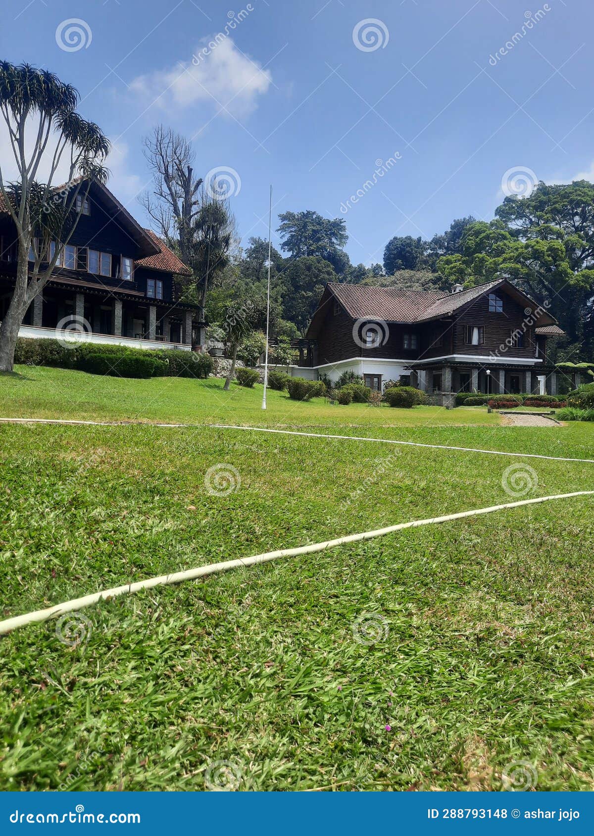 Beautiful and Beautiful House with a Large Green Grassy Yard Stock ...