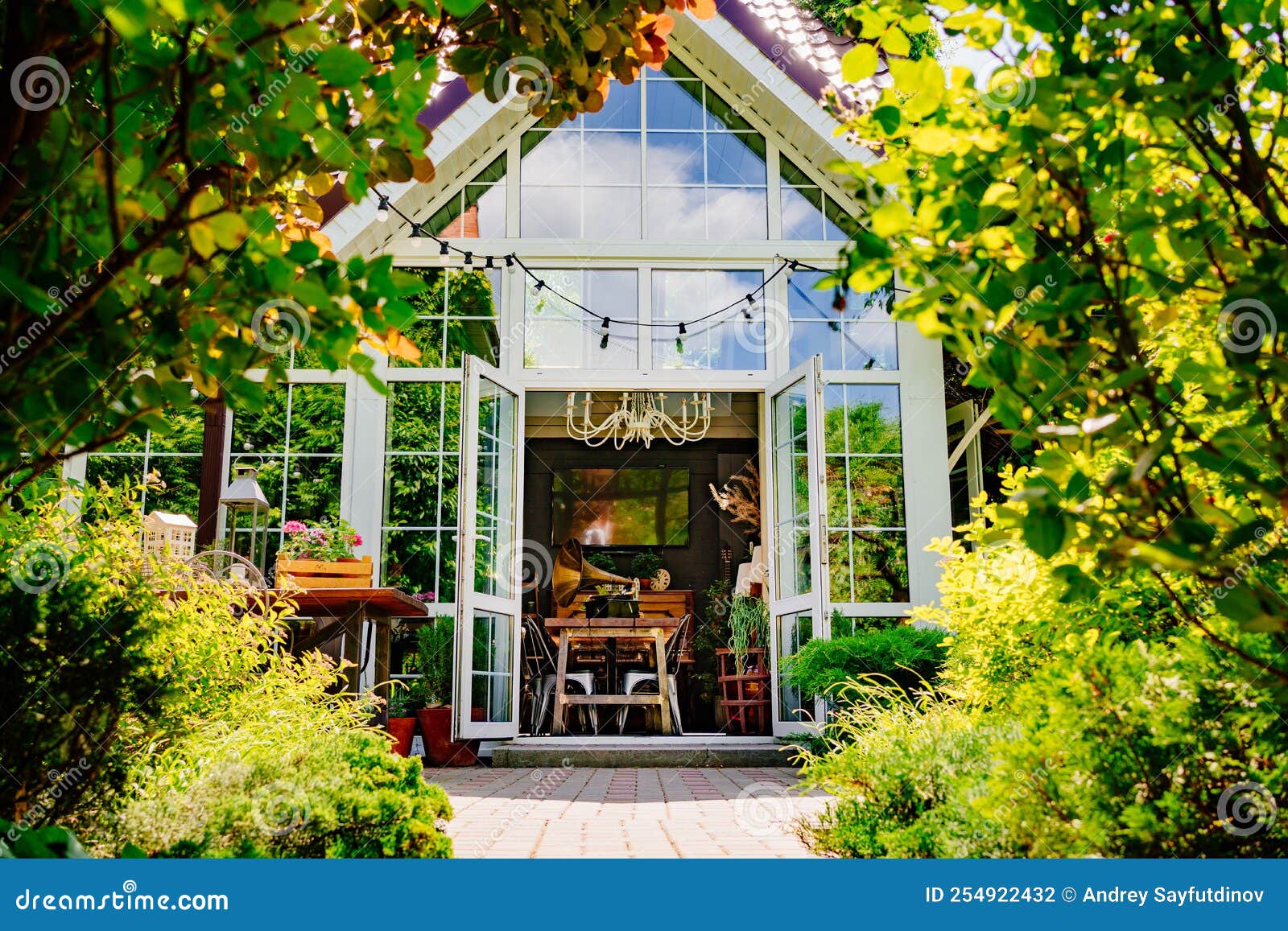 Beautiful House with Large Panoramic Windows Surrounded by Greenery ...