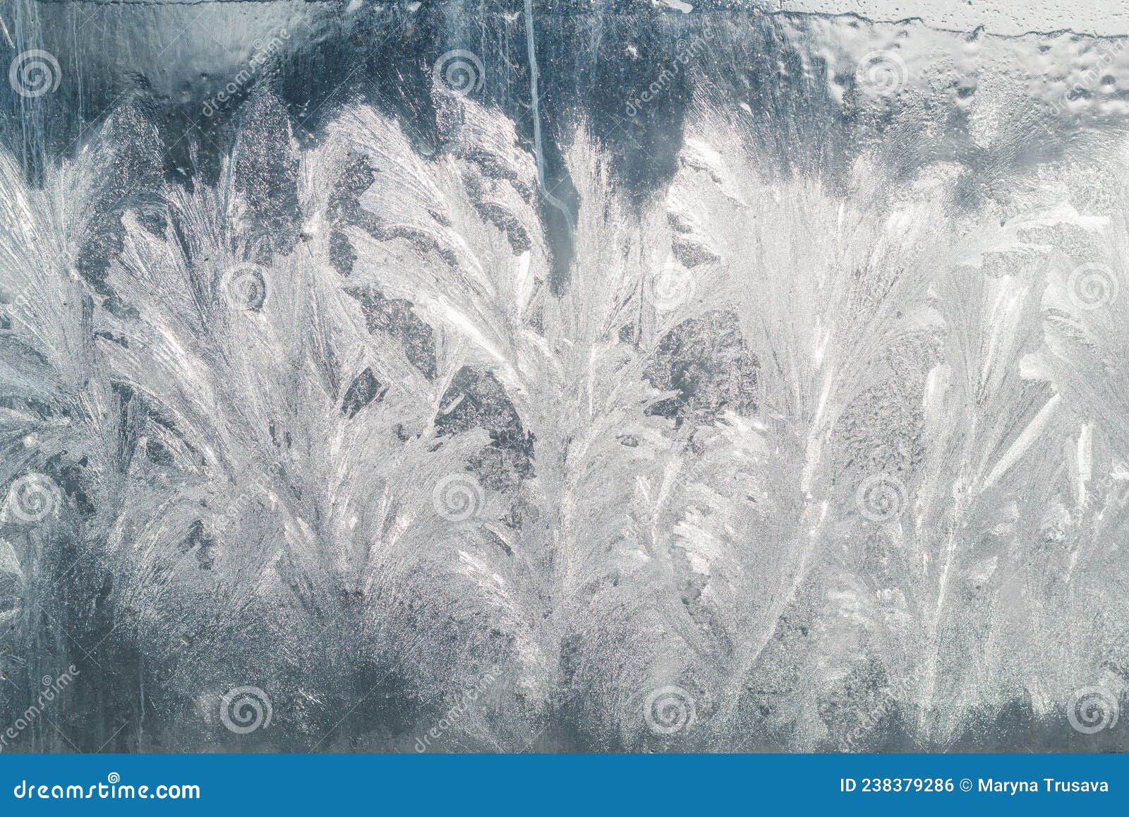 Beautiful Ice Pattern on a Glass Window in the Backlight of the Winter ...