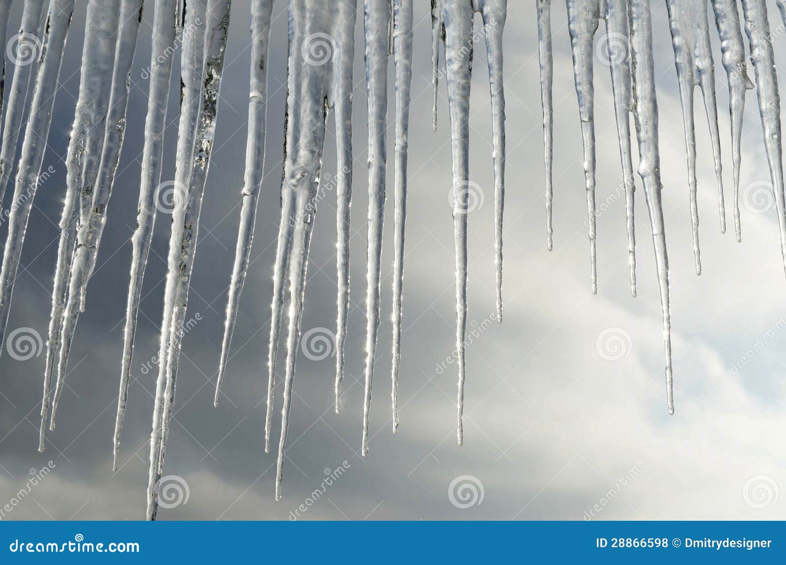 Beautiful Icicles on a Background of Clouds Stock Photo - Image of ...