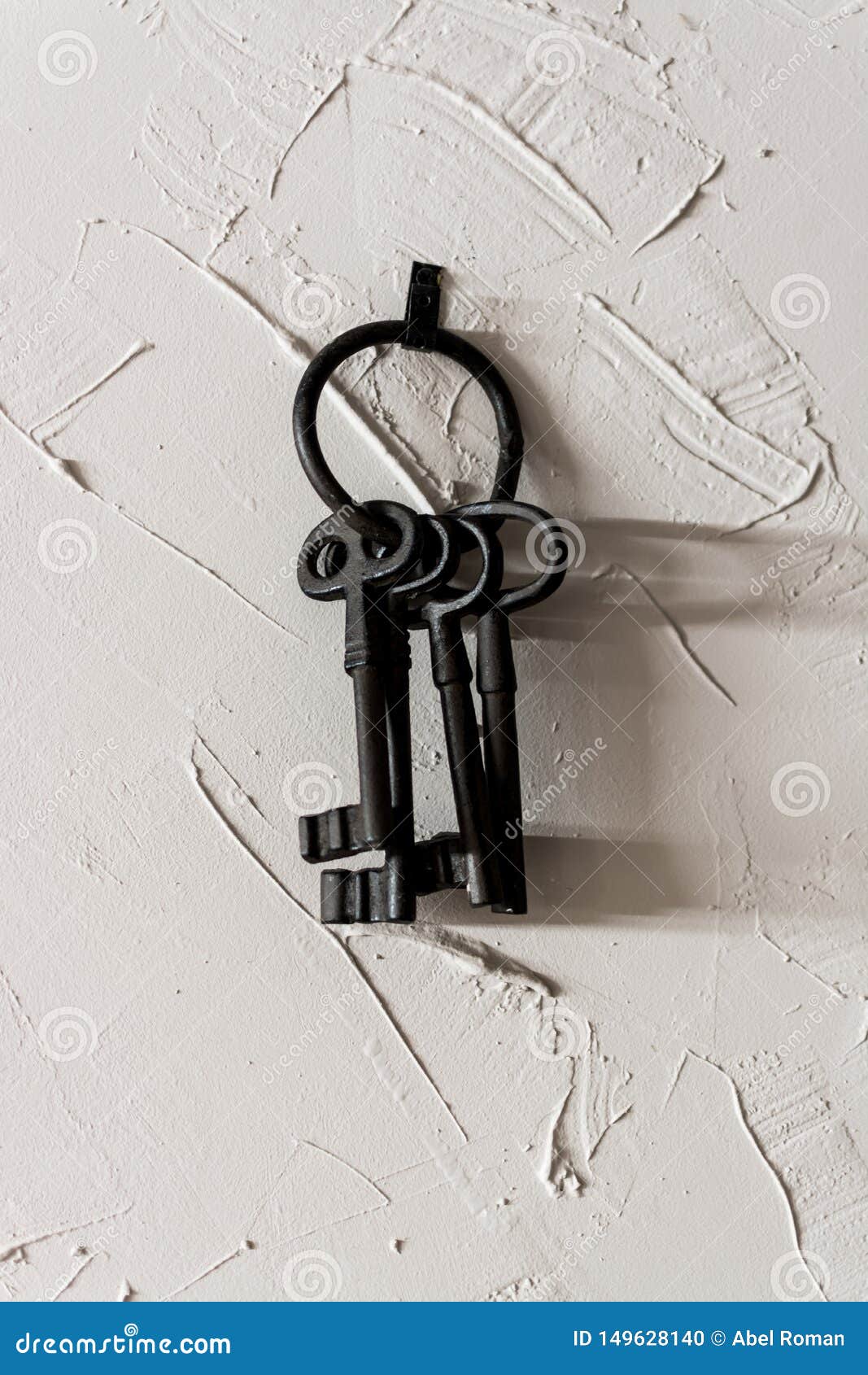 Old keys in the wall stock photo. Image of hanging, keys - 149628140