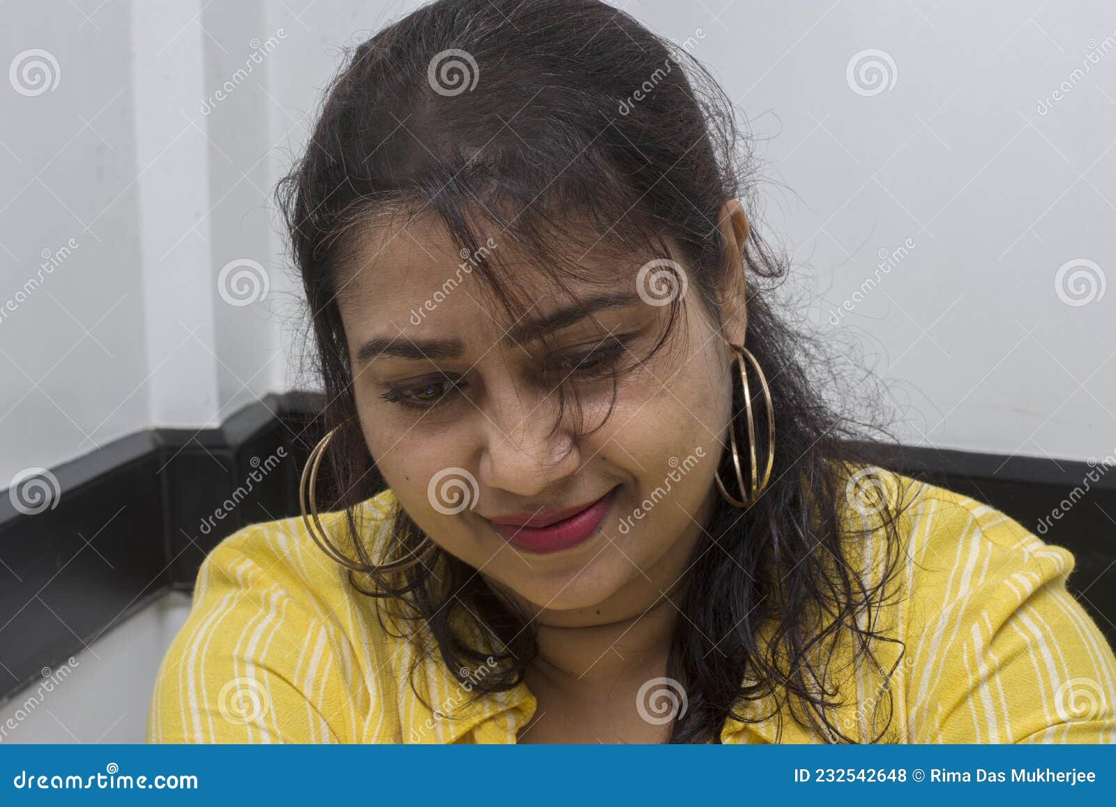 A Beautiful Indian Lady Smiling with Selective Focus Stock Photo ...