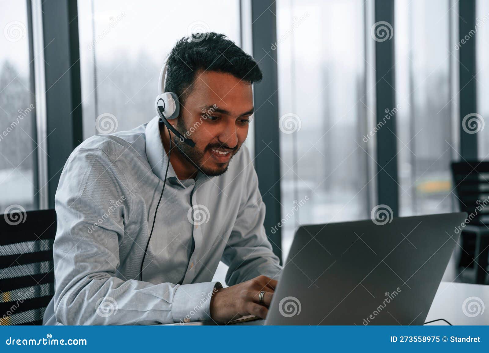 Beautiful Indian Man is Working in the Office by Laptop Stock Image ...