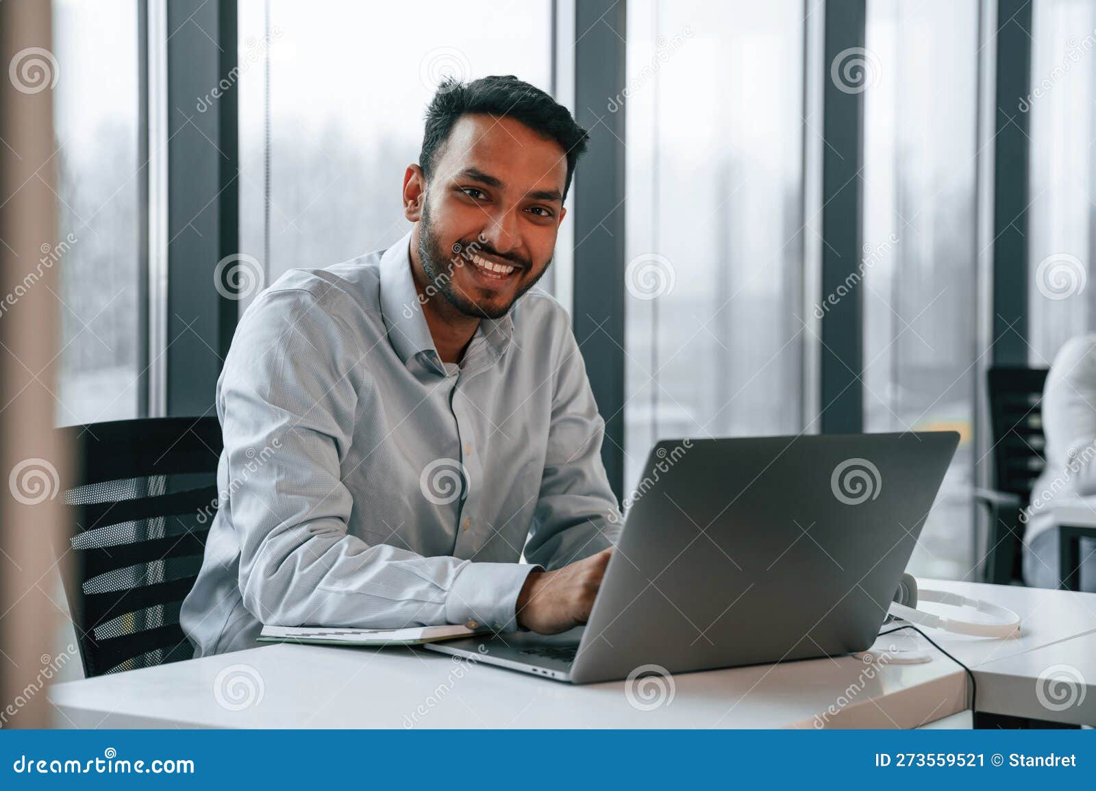 Beautiful Indian Man is Working in the Office by Laptop Stock Image ...