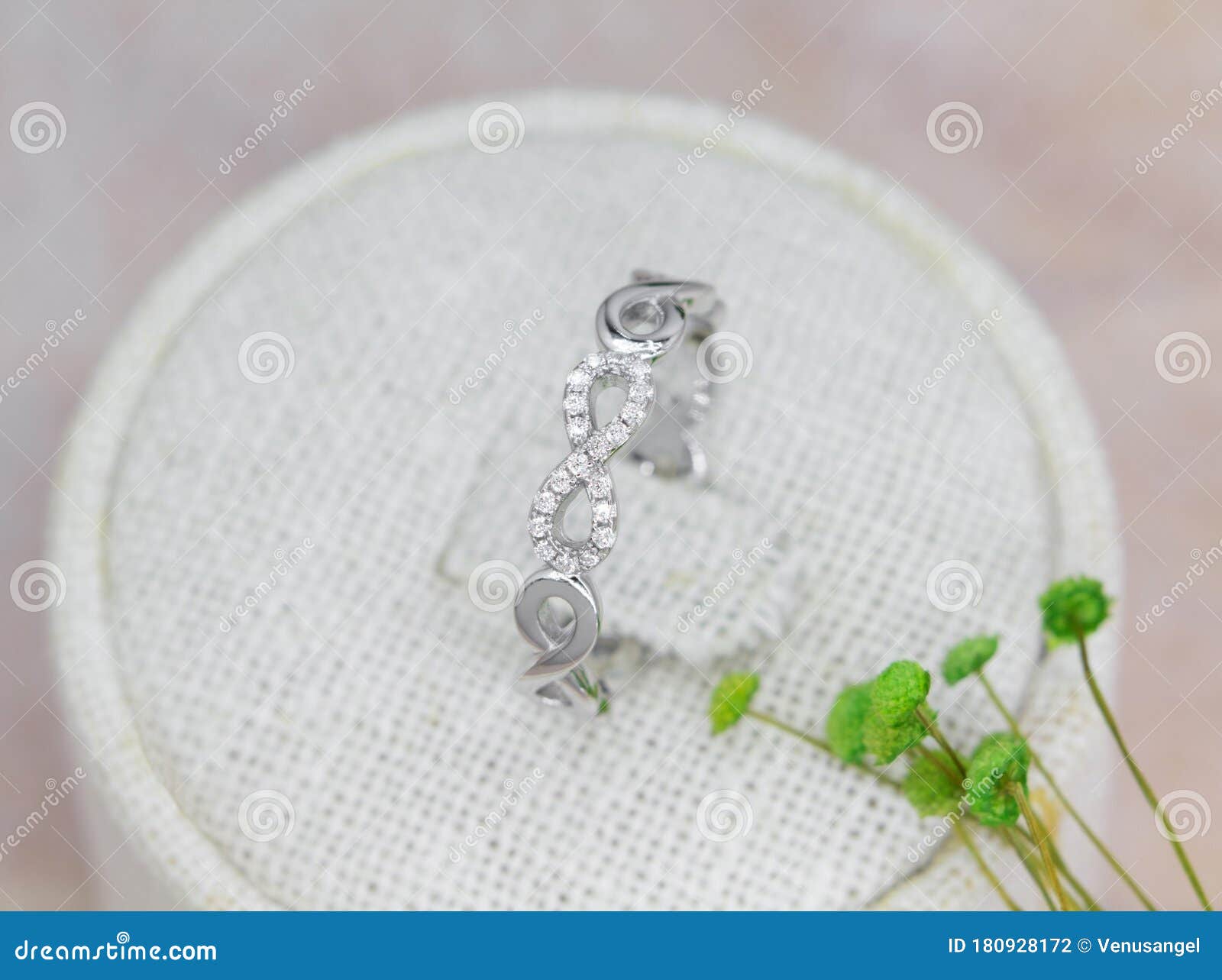 Beautiful Infinity Shape Designed Ring Decorated with Diamonds Stock ...