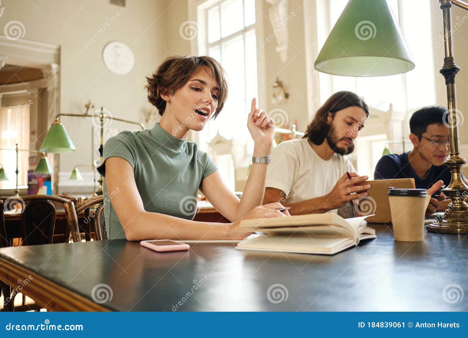 Beautiful Inspiring Student with Book Working on New Study Project in ...