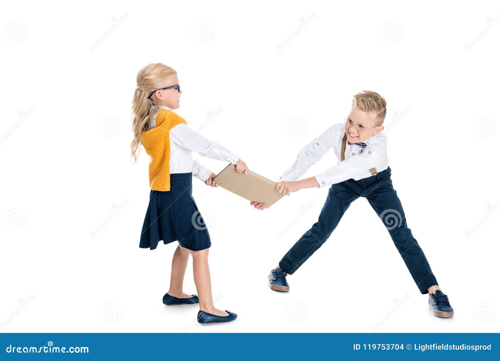 Beautiful Kids Fighting for Book Stock Photo - Image of european ...