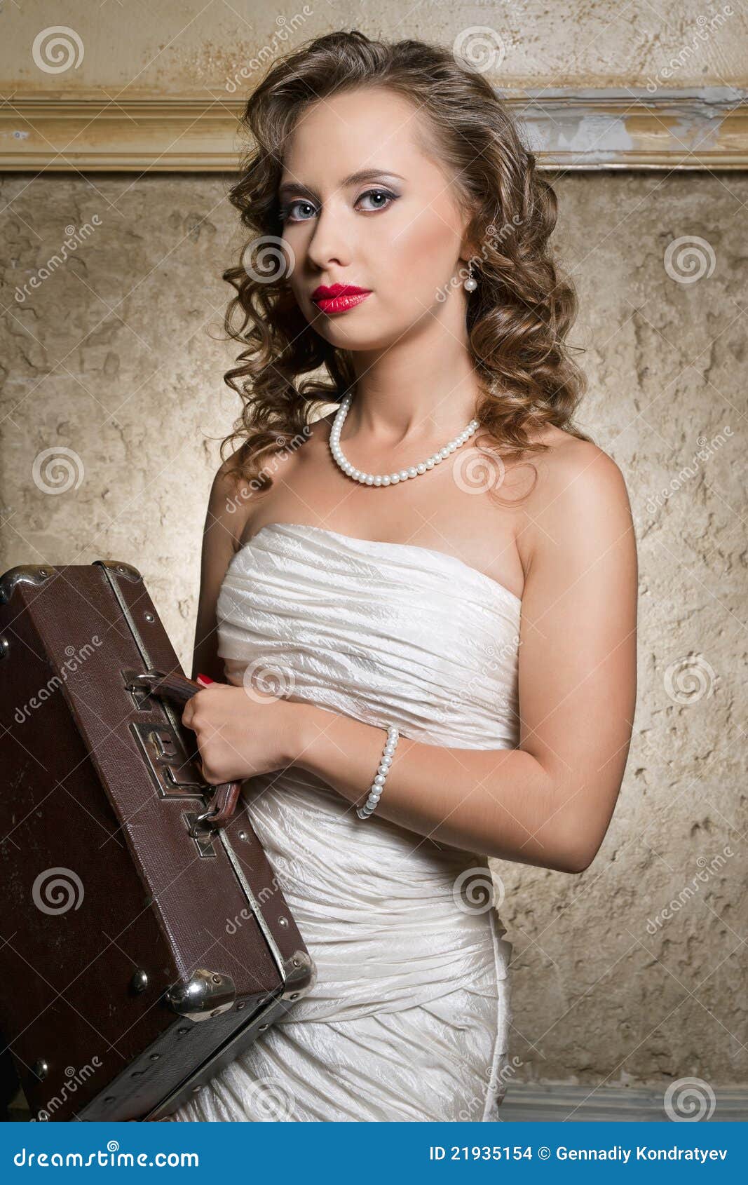 Beautiful lady with case stock photo. Image of interior - 21935154