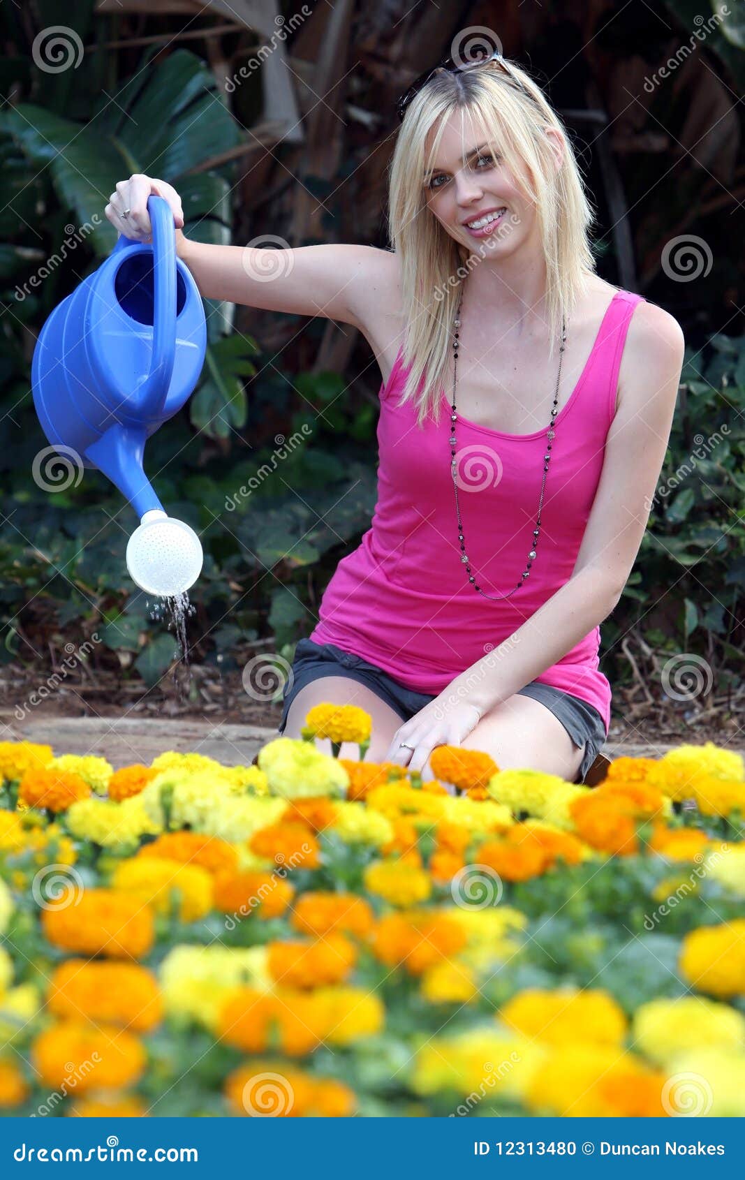 Beautiful Lady Gardening stock photo. Image of orange - 12313480