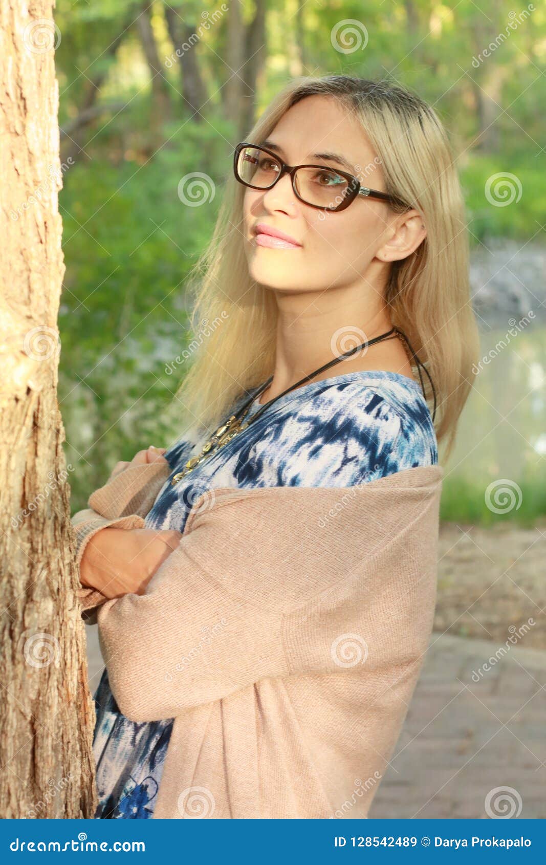 Beautiful lady in the park stock image. Image of shawl - 128542489
