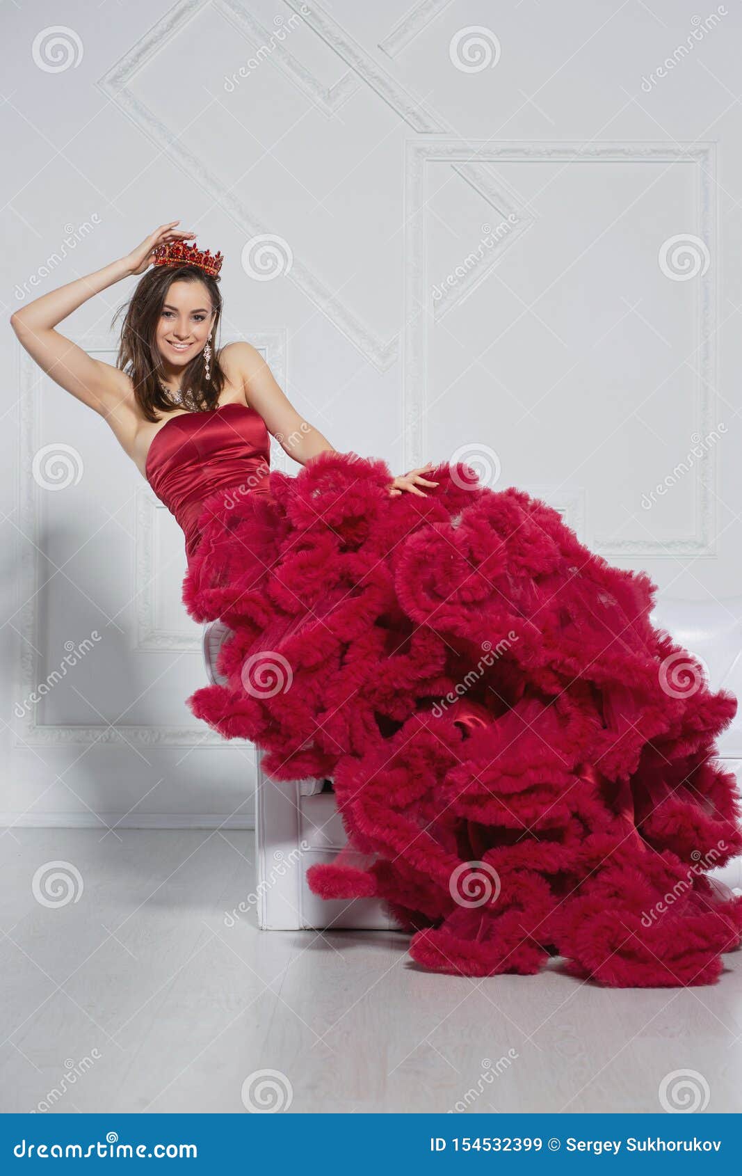 Beautiful Lady Posing in a Studio Posing on a Sofa Stock Image - Image ...