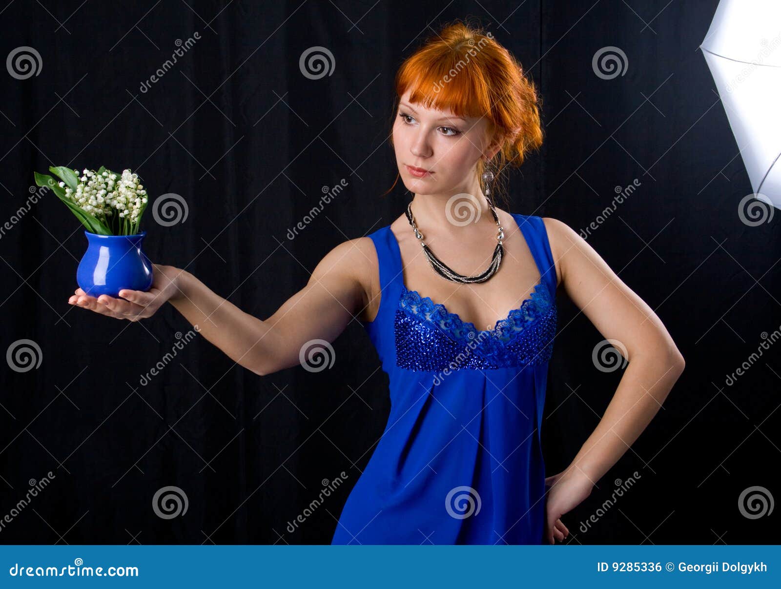 Beautiful Lady Smelling Flowers Stock Photo - Image of blue, beautiful ...