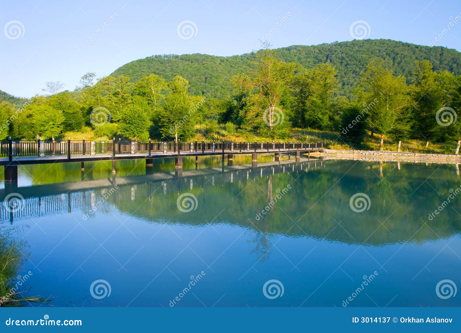 Beautiful lake with bridge stock image. Image of reflection - 3014137