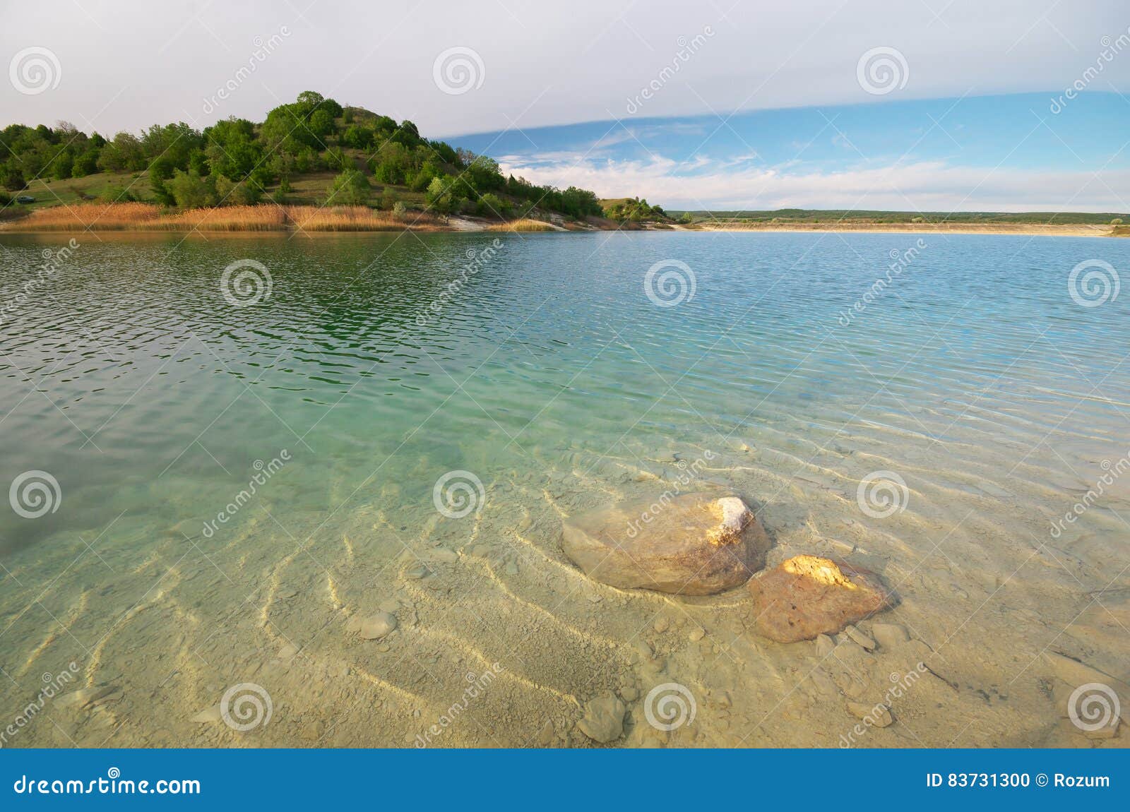 Beautiful lake water stock photo. Image of calm, green - 83731300