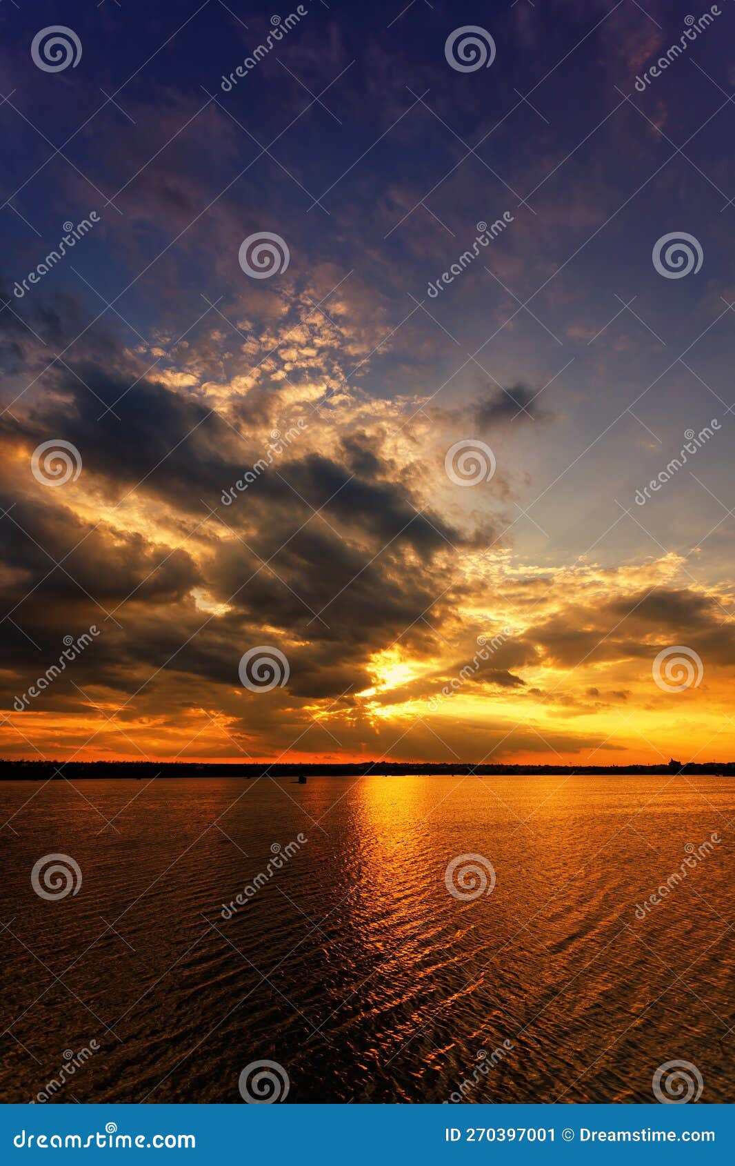Beautiful Lakeside Sunset With Dramatic Sky And Clouds Royalty-Free ...