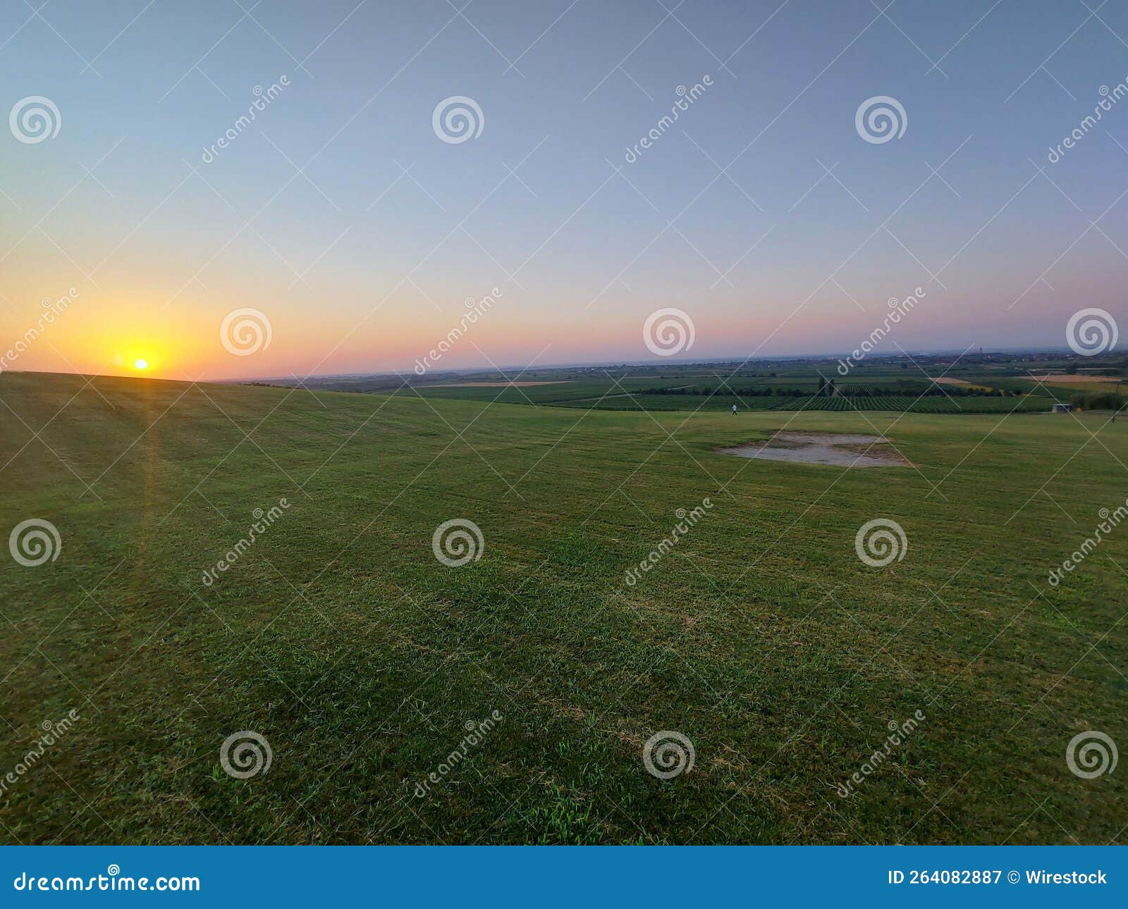 Beautiful Landscape of a Green Field at a Calm Sunset Stock Image ...