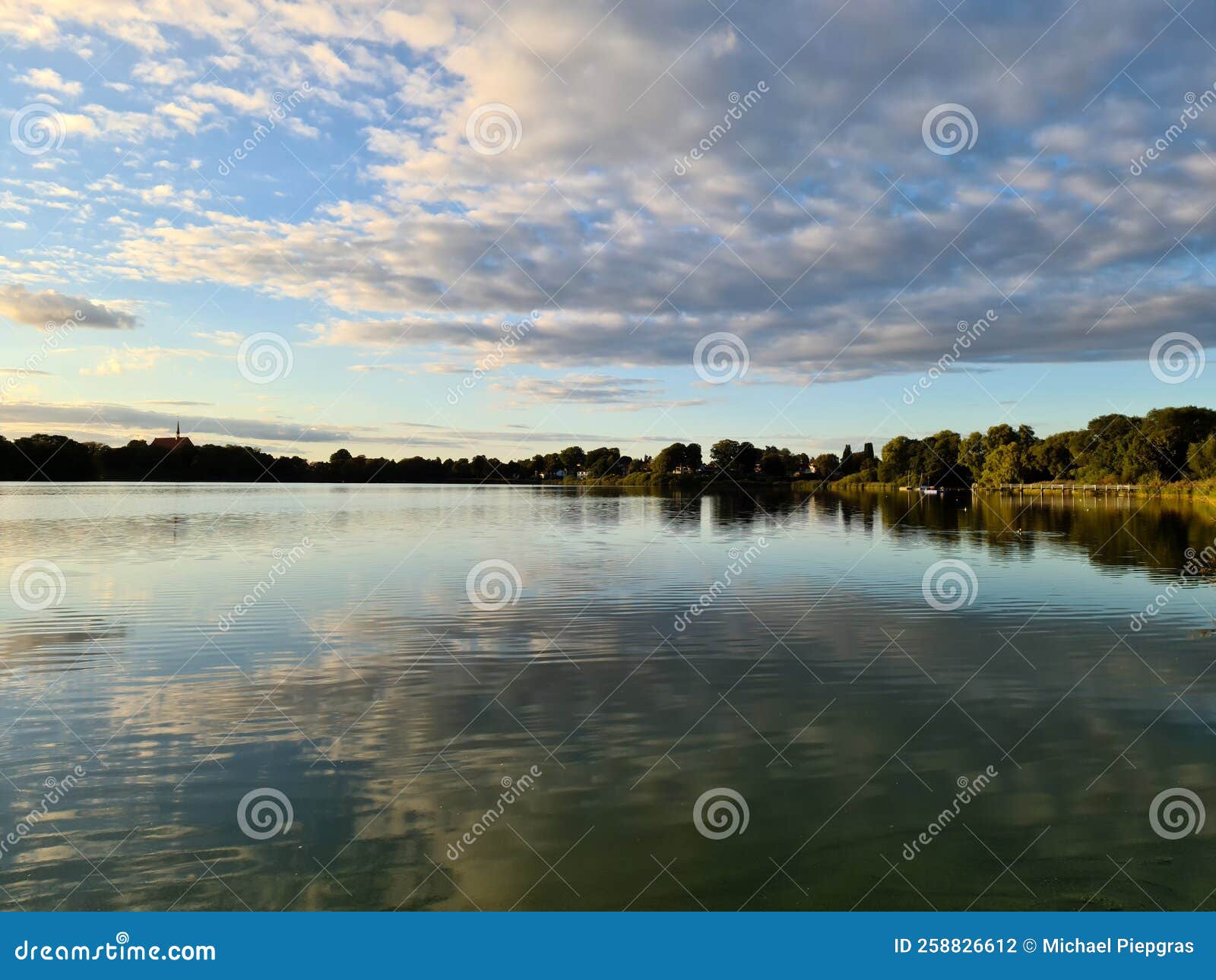 Beautiful Landscape at a Lake with a Reflective Water Surface Stock ...