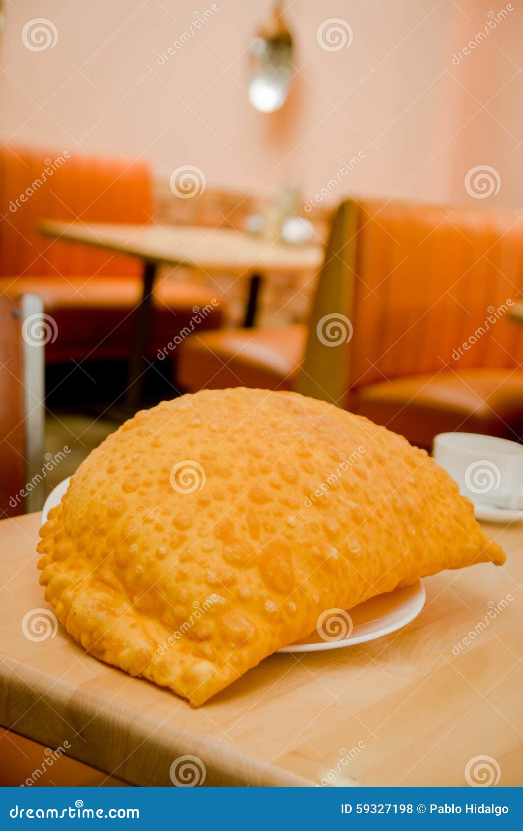 Beautiful Large Yellow Colored Empanada Sitting on Stock Photo - Image ...