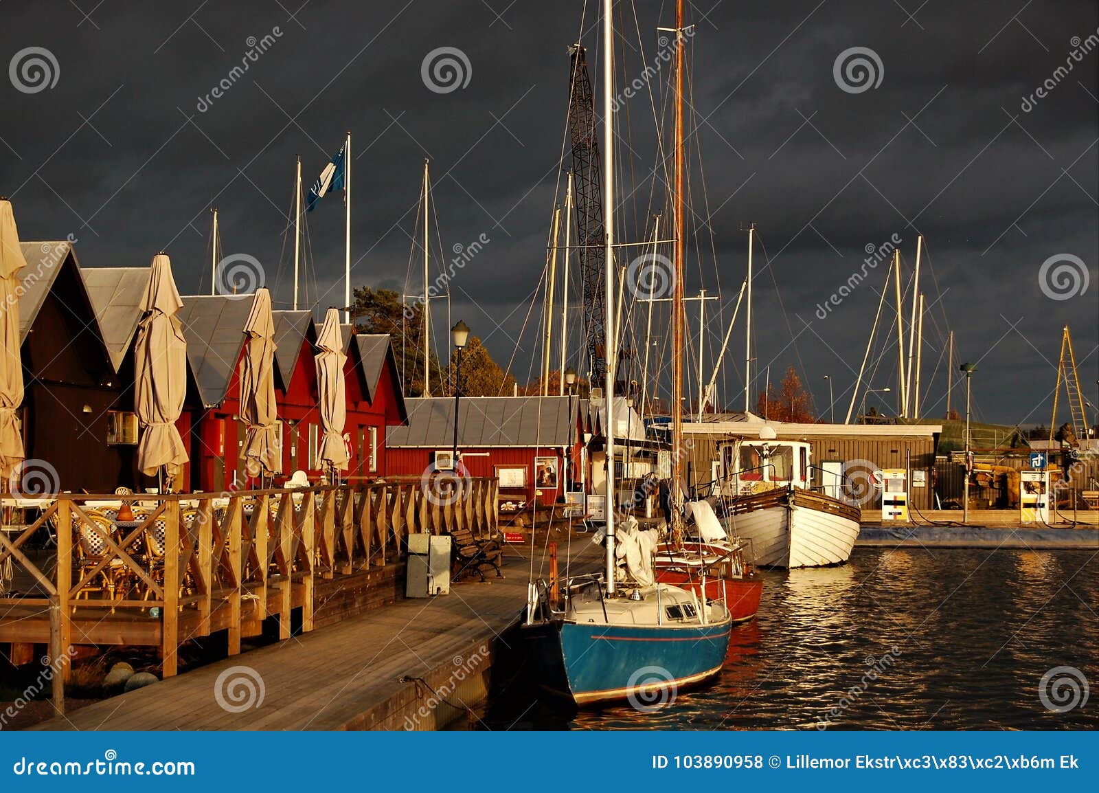 Rain cloud vs. sun stock photo. Image of rain, contrast - 103890958