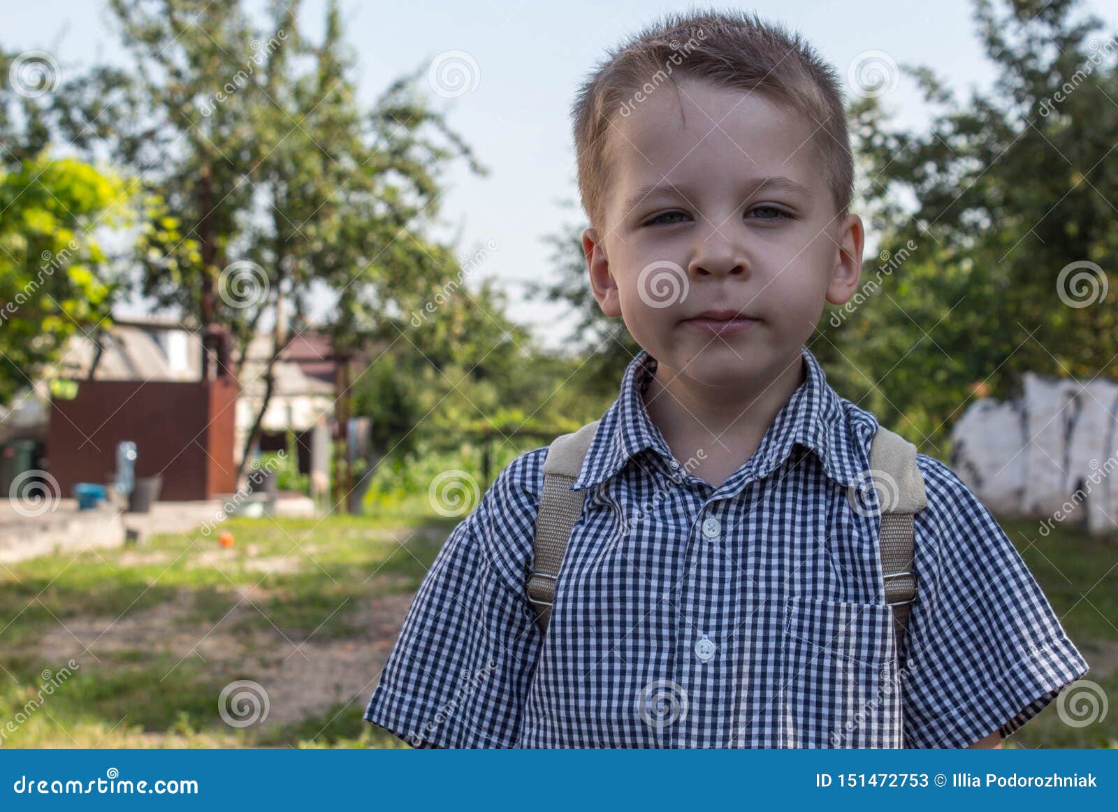 A Beautiful Little Boy in the Yard with a Backpack Stock Image - Image ...