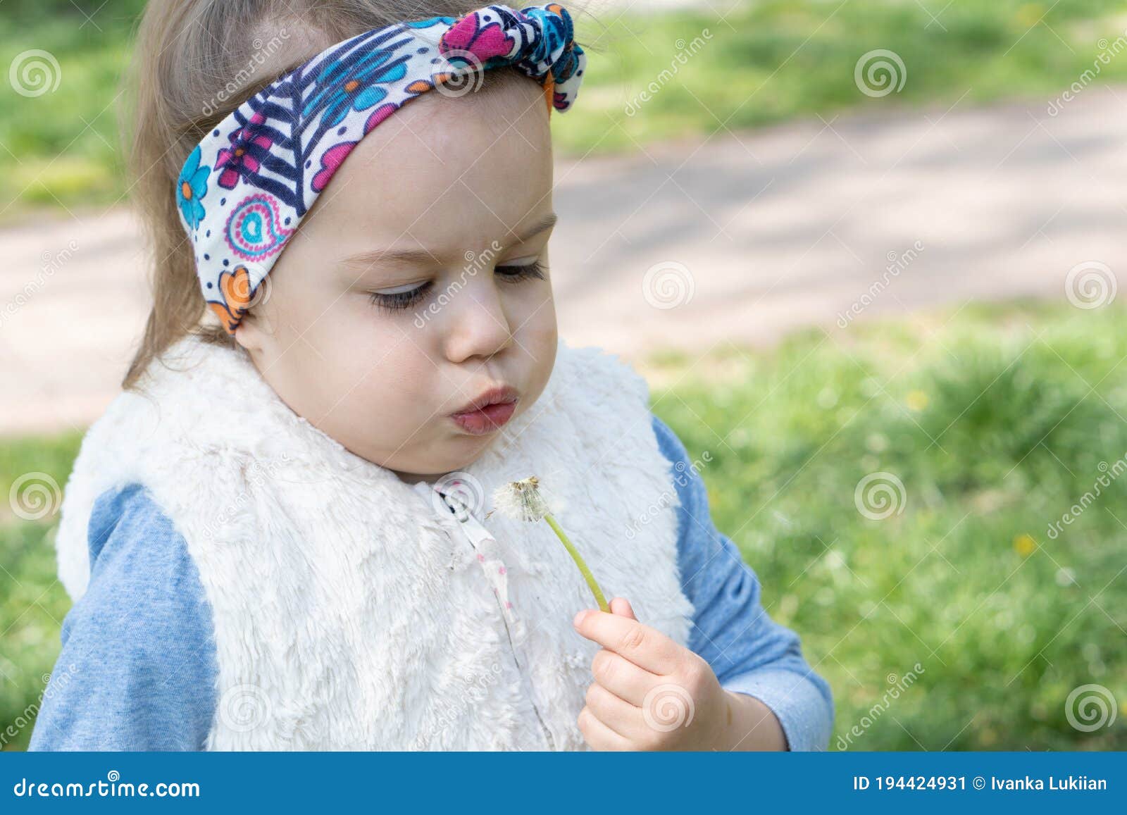 Beautiful Little Girl Blowing Dandelion. Cute Girl on the Medow Stock ... Beautiful Little Girl Blowing Dandelion. Cute Girl on the Medow Stock ...