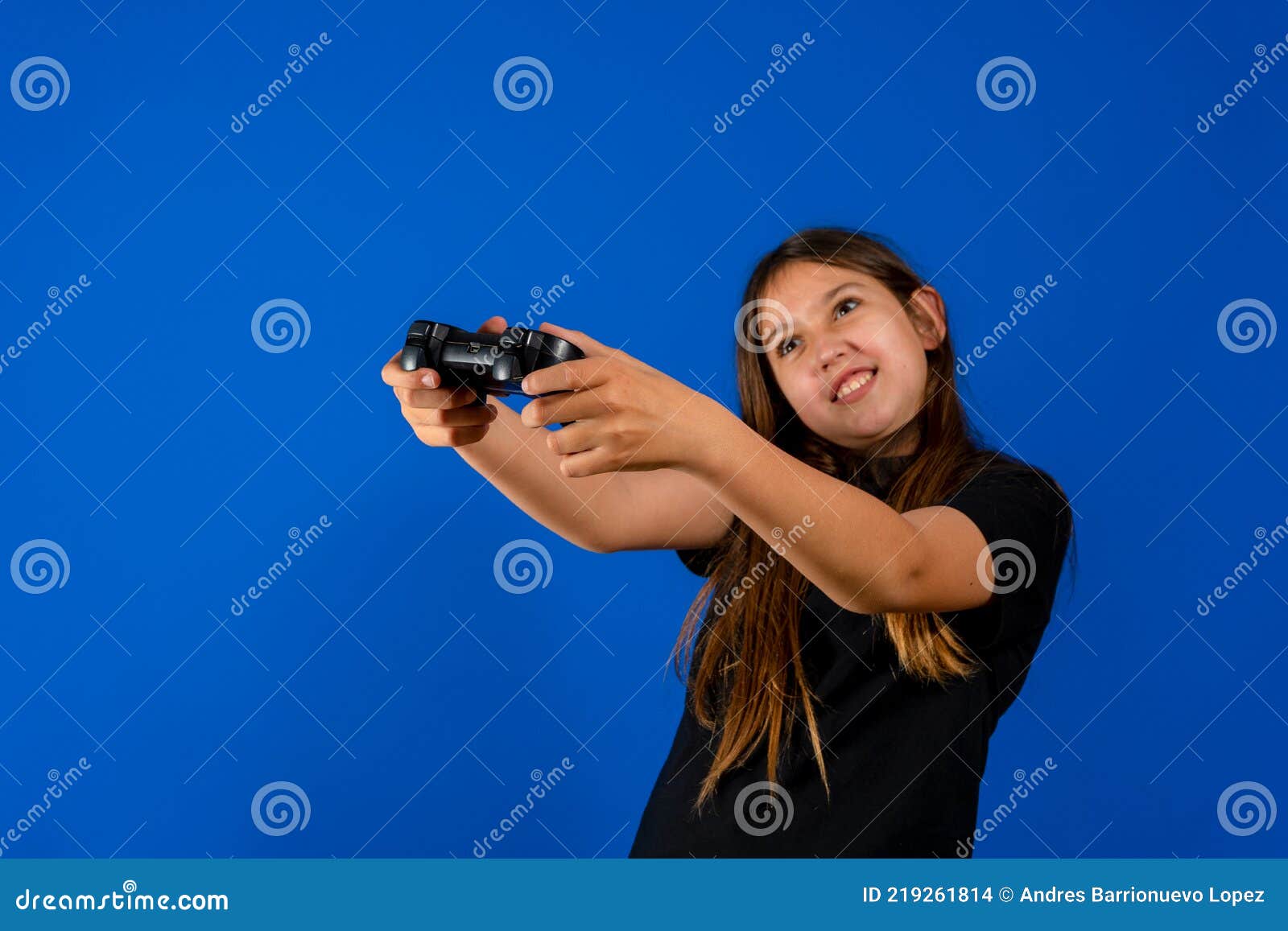 Beautiful Little Girl Playing with a Game Console Controller Isolated ...