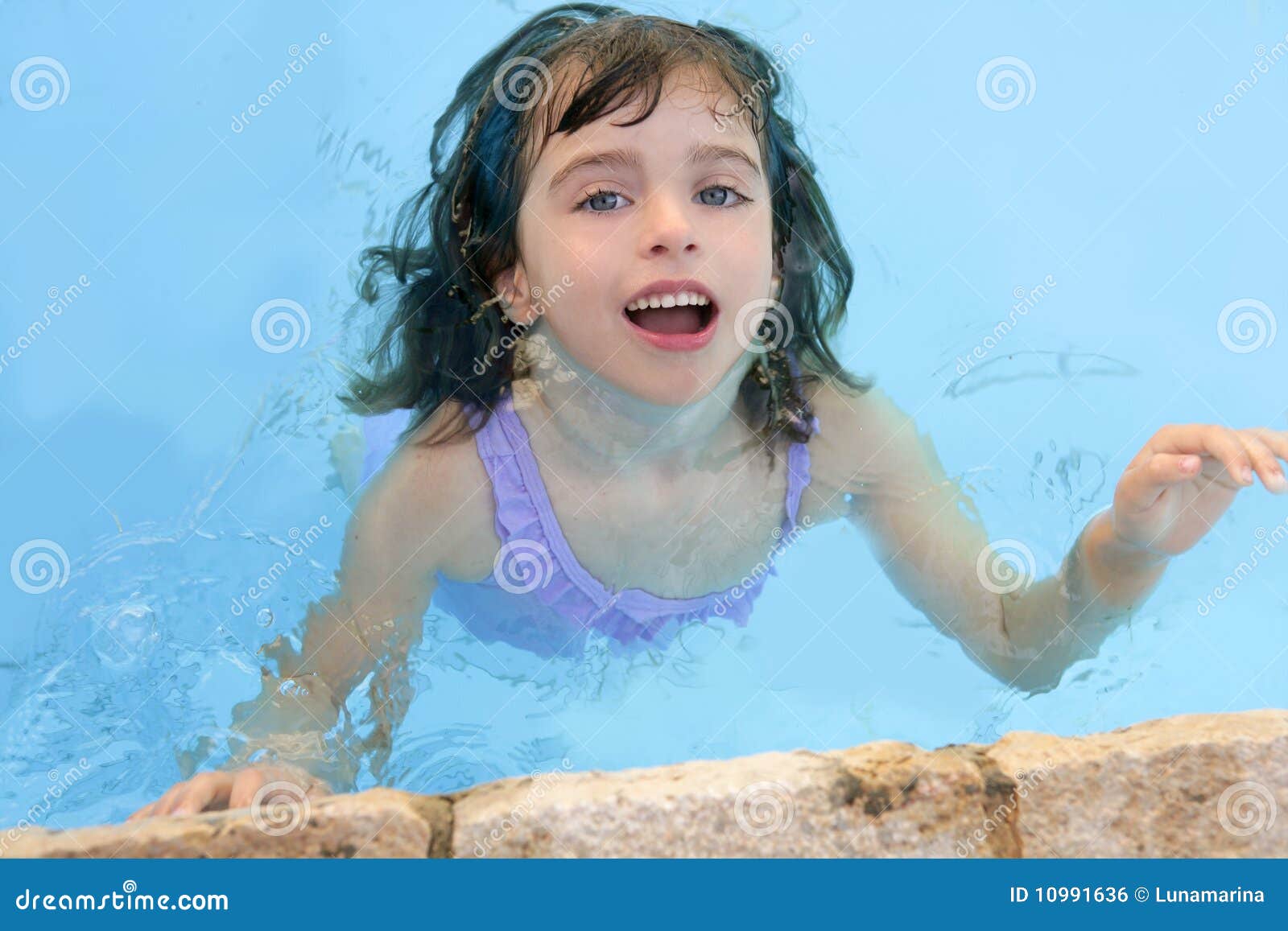 Beautiful Little Girl Smiling in Pool Stock Photo - Image of little ...
