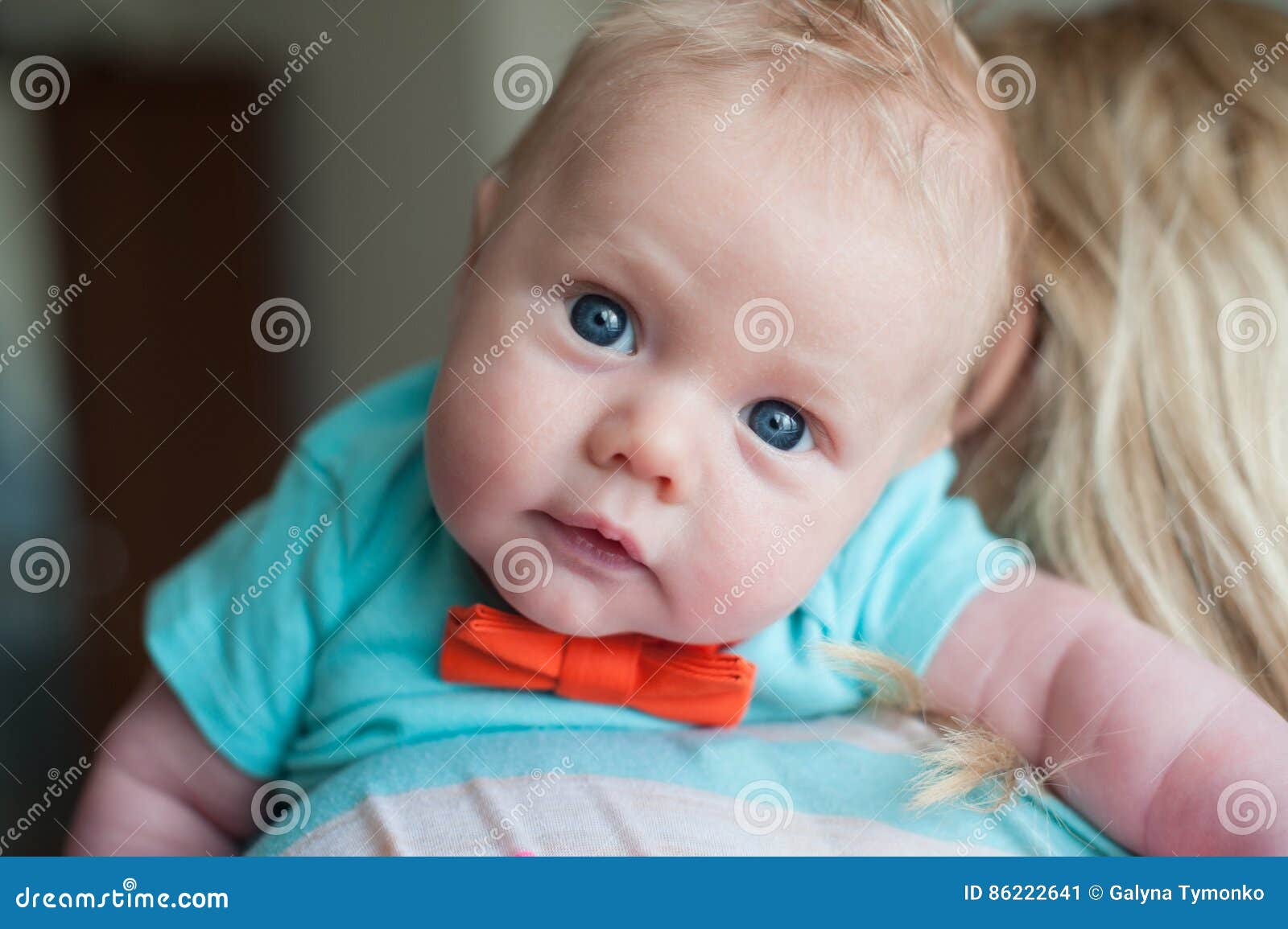 Beautiful Little Kid Looking Over Mother Shoulder Stock Image - Image ...