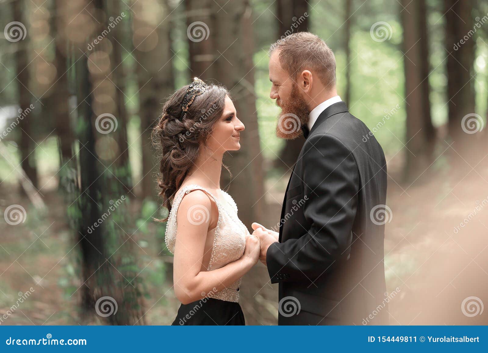 Beautiful in Love Couple on the Background of Trees in the Forest Stock ...