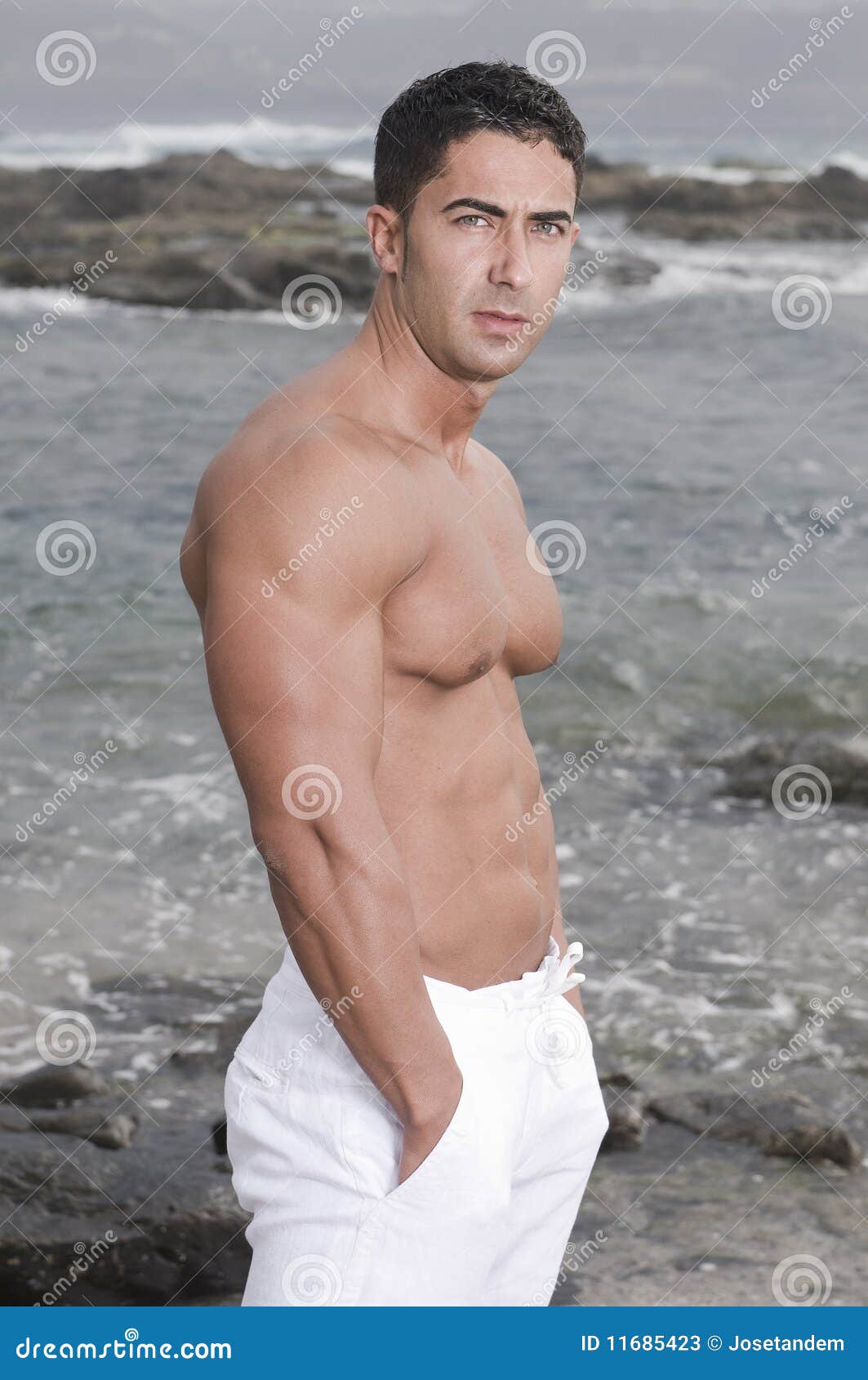 Beautiful man near the sea stock image. Image of outside - 11685423