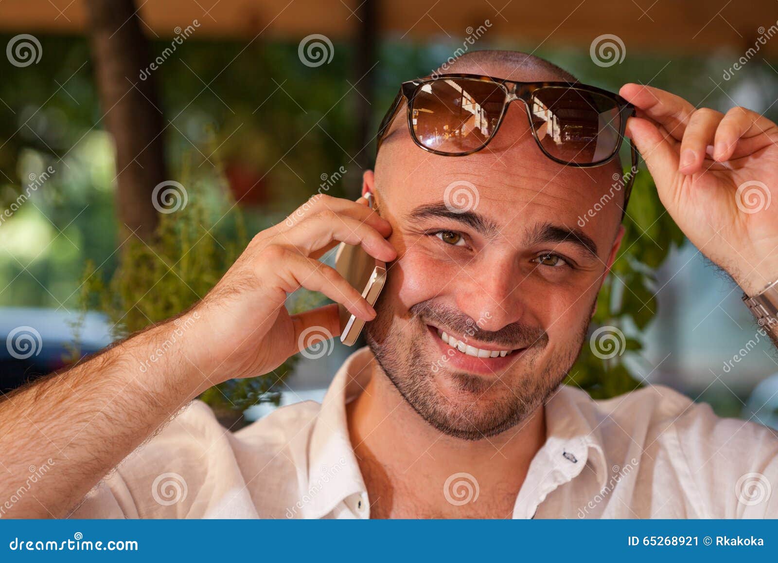 Beautiful Man Smiling while on the Phone Stock Image - Image of fashion ...