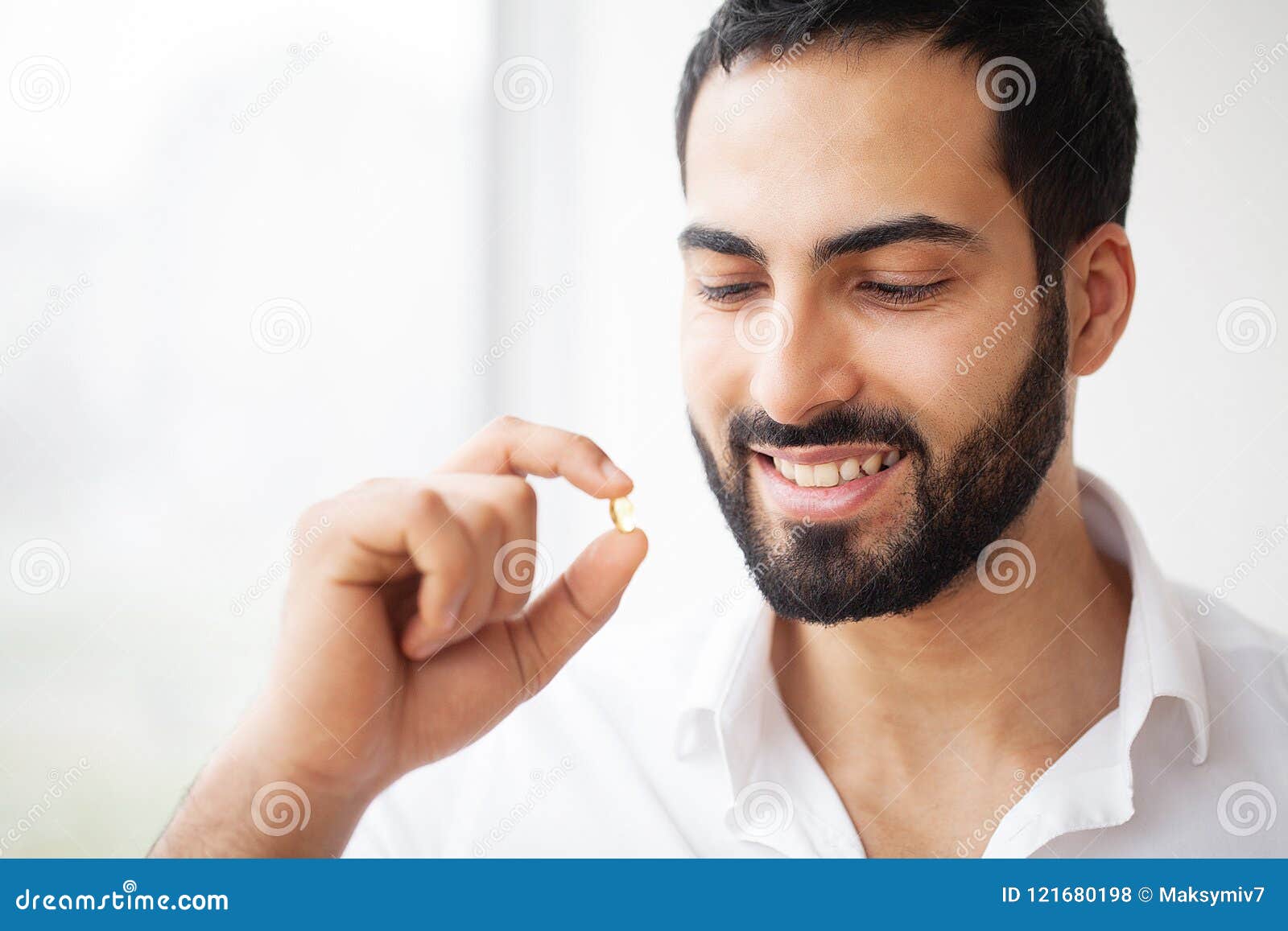 Beautiful Man Taking Pill, Medicine. Vitamins and Supplements Stock ...