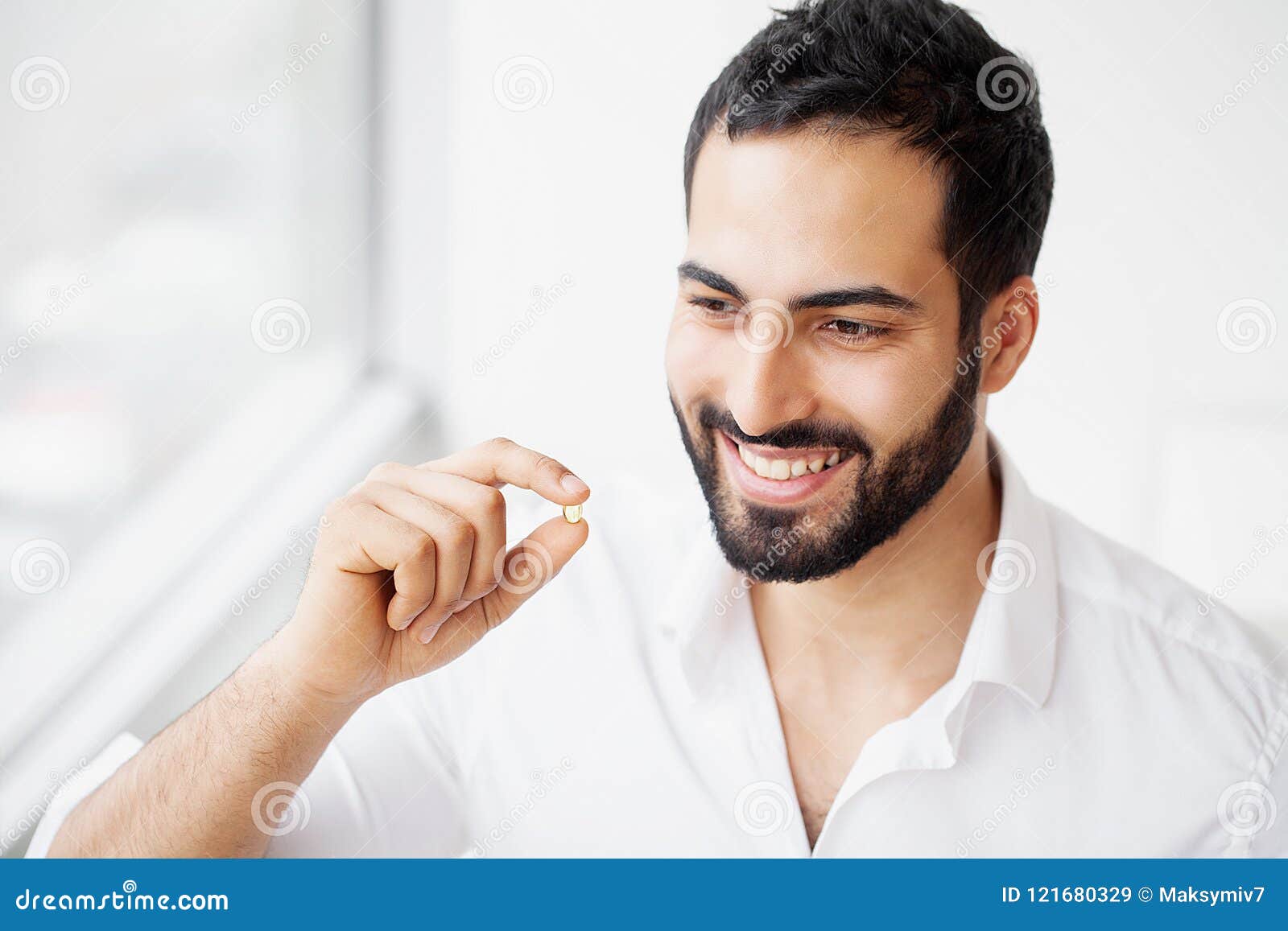 Beautiful Man Taking Pill, Medicine. Vitamins and Supplements Stock ...