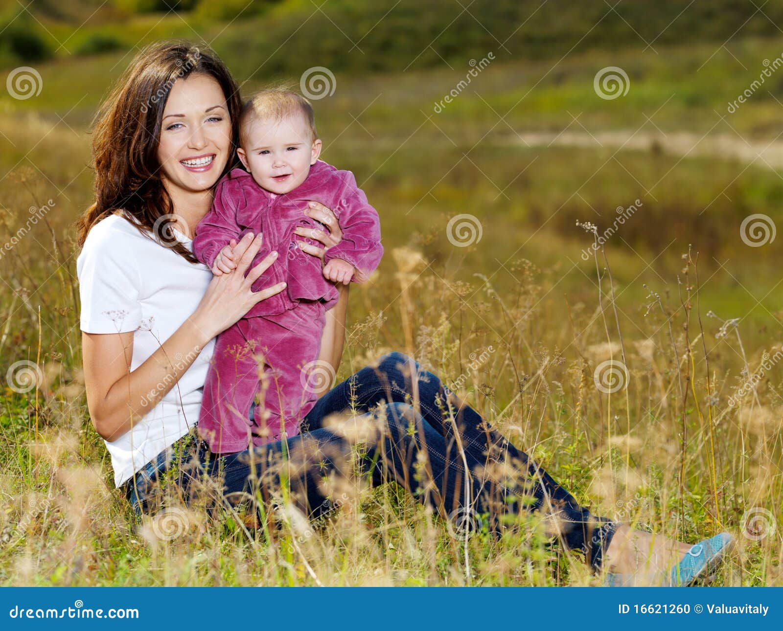Beautiful Mather with Smiling Beby on Nature Stock Photo - Image of ...