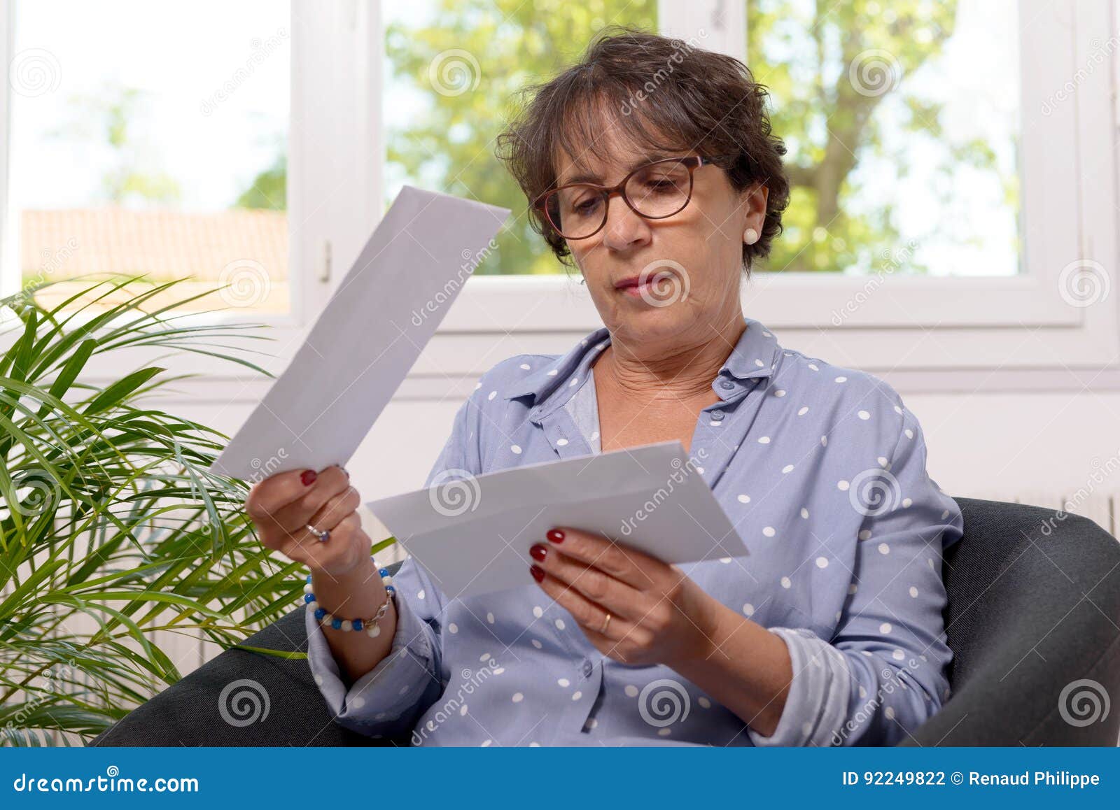 Beautiful Mature Woman Opens the Mail Stock Photo - Image of read ...