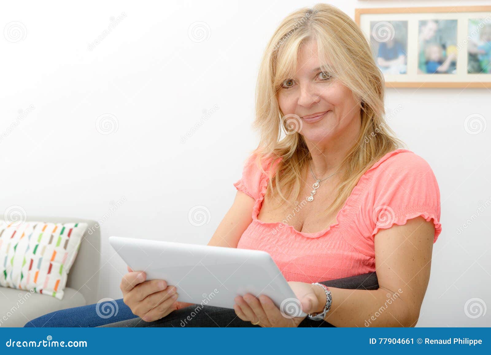 Beautiful Mature Woman Using Electronic Tablet at Home Stock Image ...