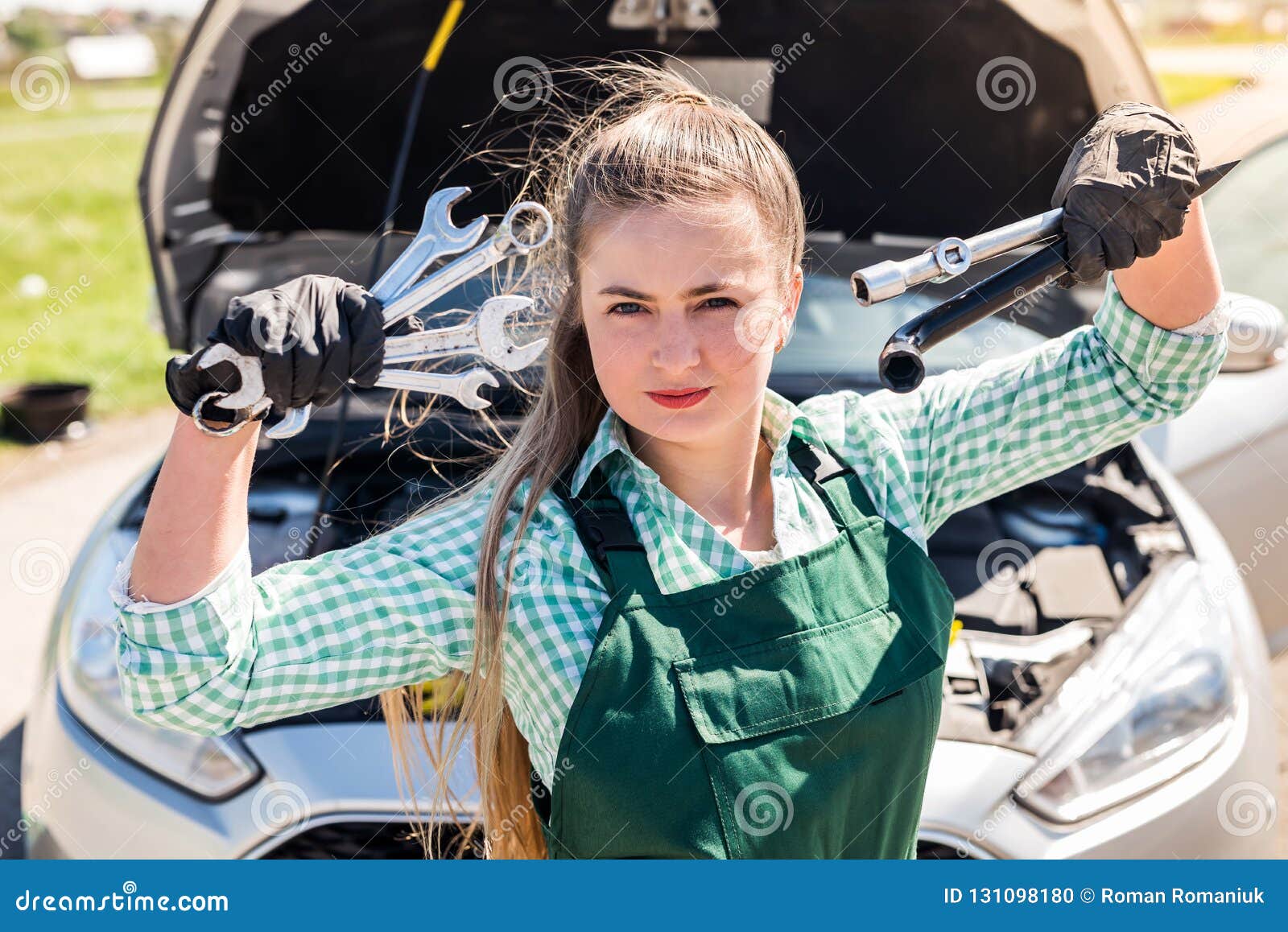 Beautiful Mechanic Posing with Different Tools before Car Stock Photo ...