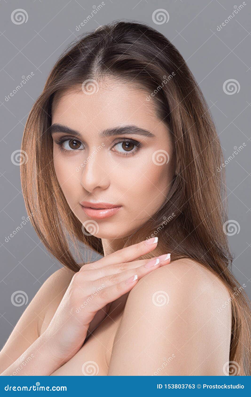 Beautiful Millennial Girl Touching Her Smooth Bare Shoulder Stock Image