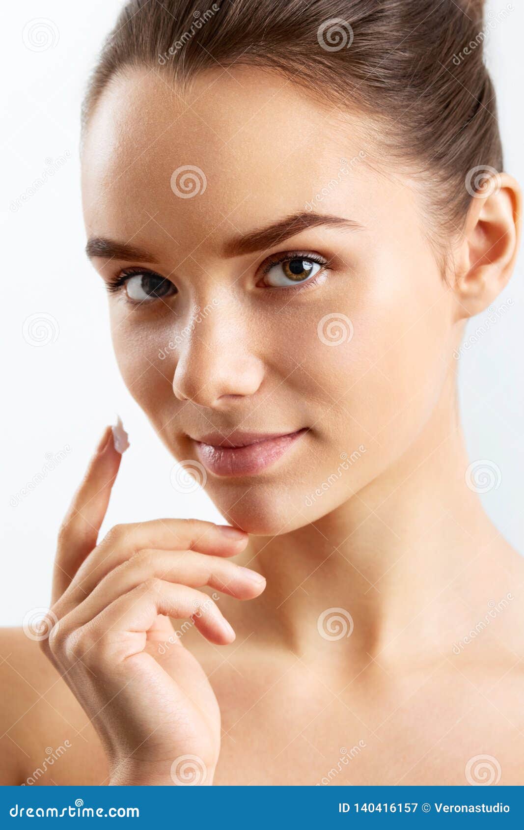 Beautiful Model Applying Cosmetic Cream on Her Face Stock Image - Image ...