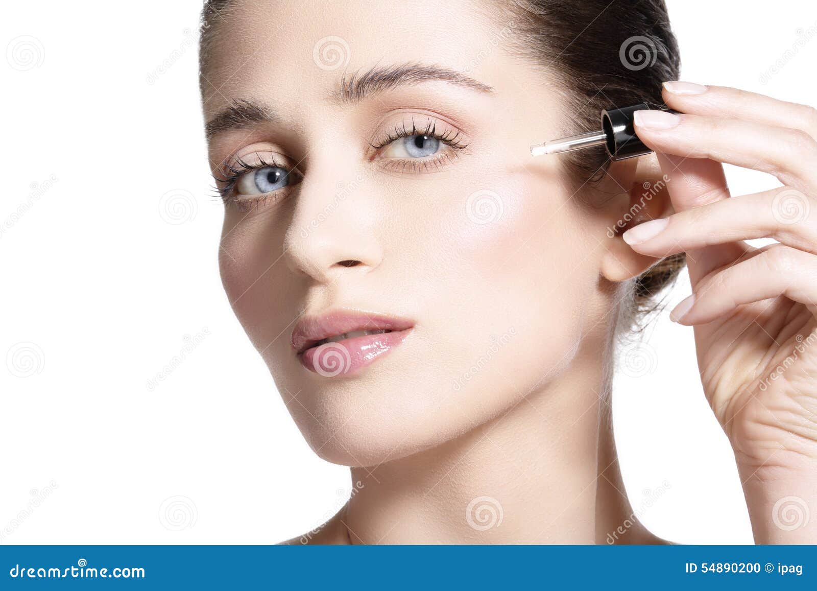 Beautiful Model Applying a Skin Serum Treatment Stock Photo - Image of ...