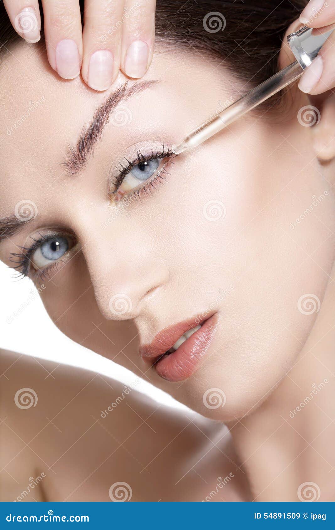 Beautiful Model Applying a Skin Serum Treatment Stock Image - Image of ...