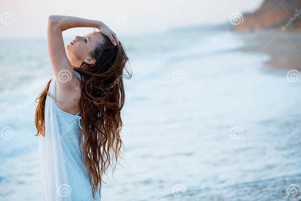 Beautiful Model on Beach at Sunset Stock Photo - Image of cold, glamour ...